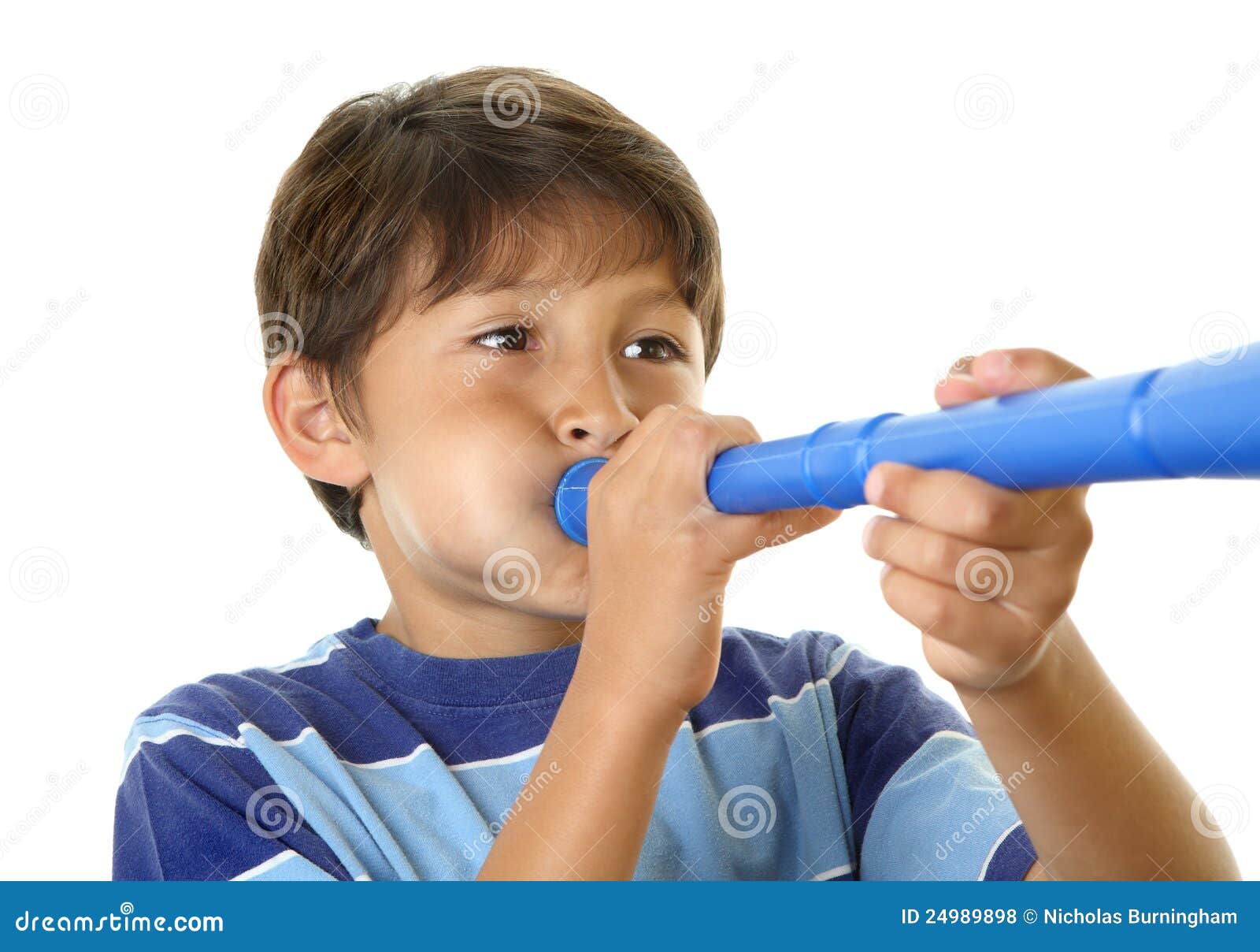 Boy blowing blue toy horn stock photo. Image of enjoyment - 24989898