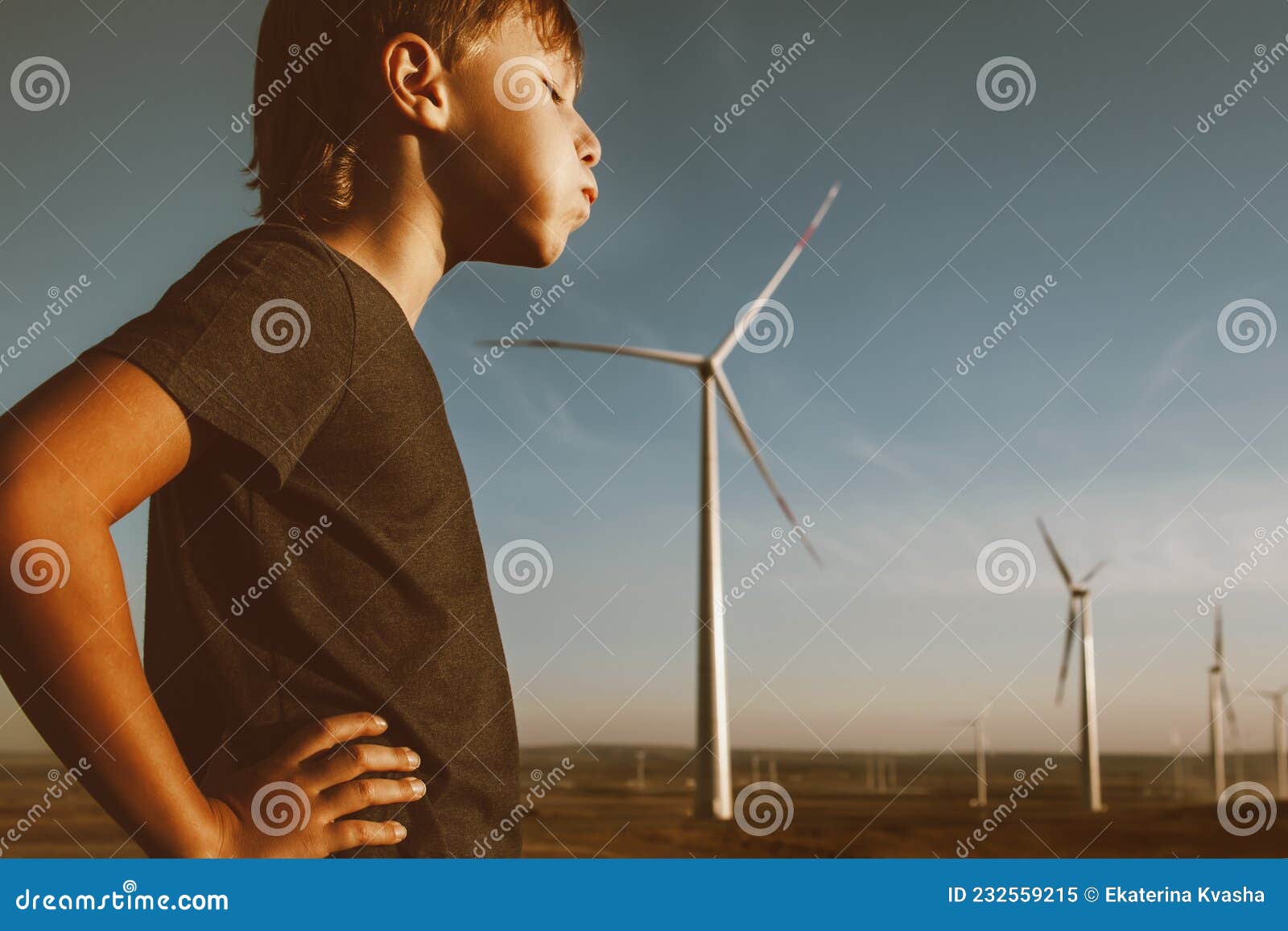 A Boy Blows on a Huge Wind Generator - a Man Conquers the Elements ...