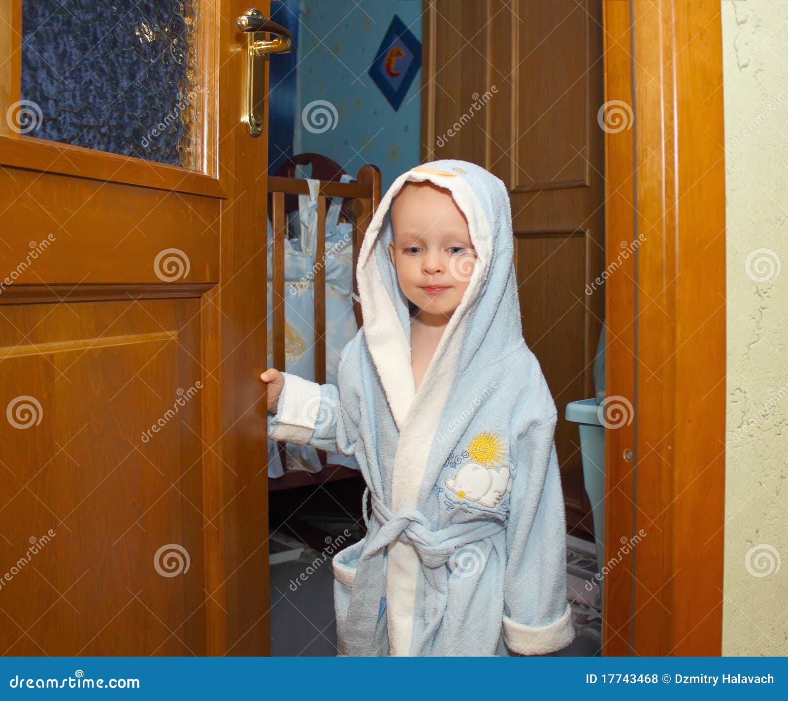 A boy in a blue robe stock photo. Image of night, small - 17743468