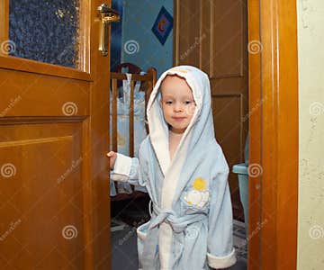 A boy in a blue robe stock photo. Image of night, small - 17743468