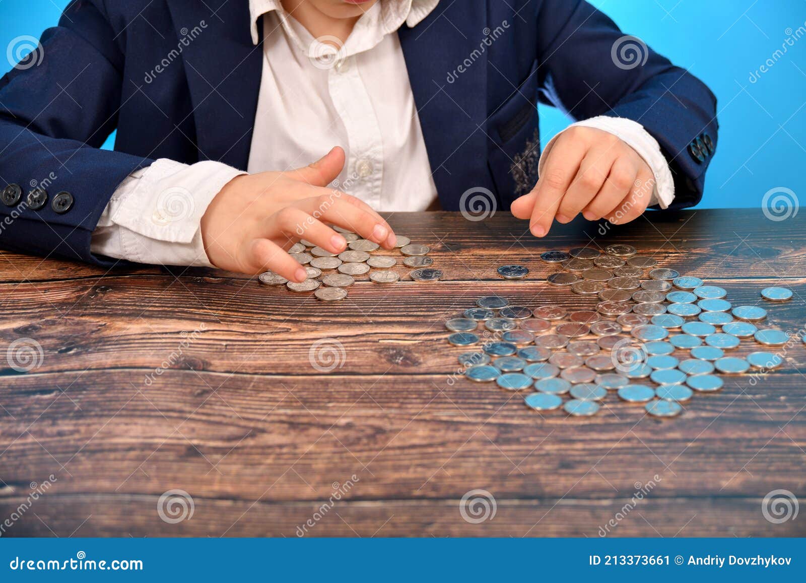A Boy in a Blue Suit is Counting Money Stock Image - Image of inflation ...
