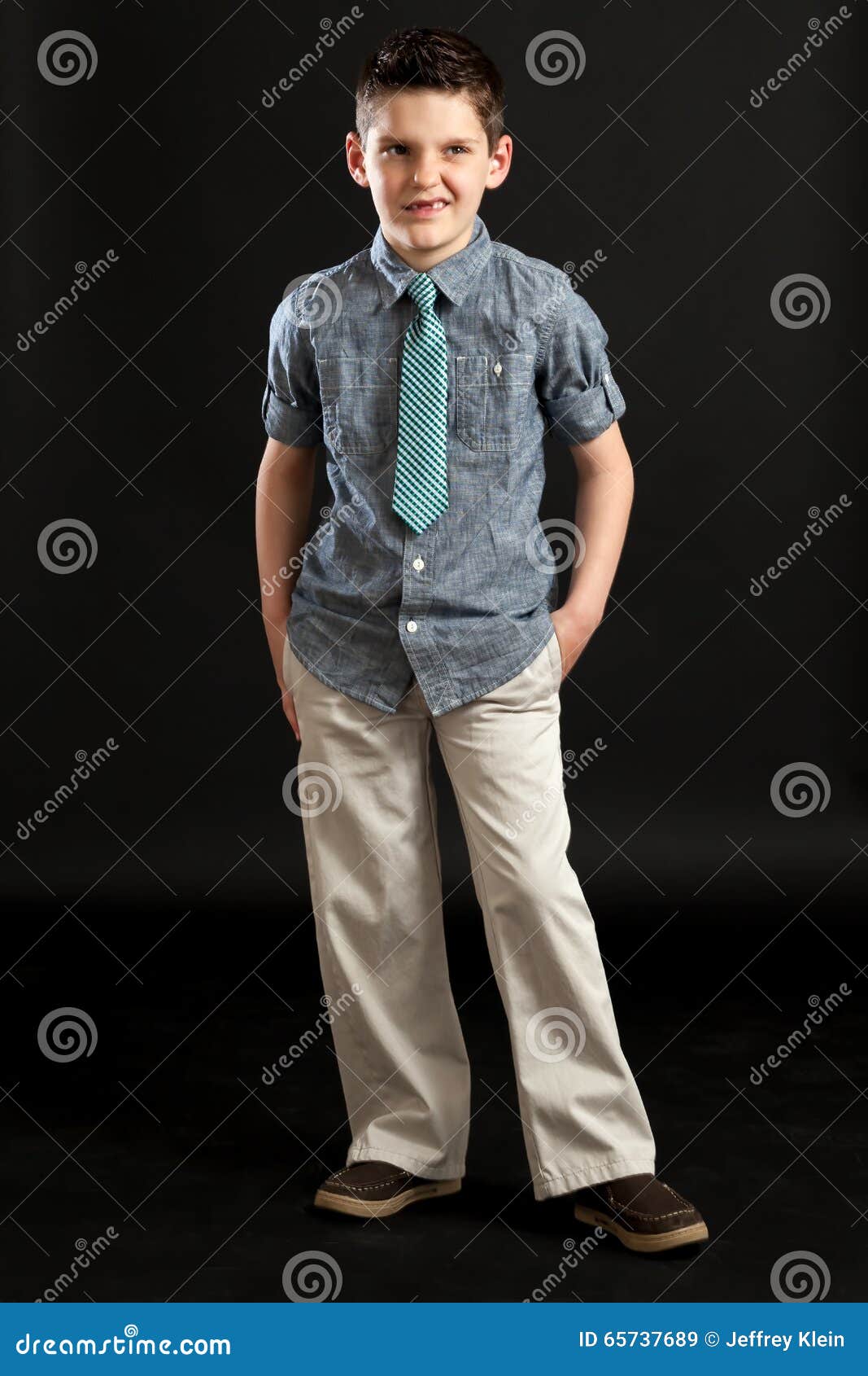 Boy in Blue Tie Snickering stock image. Image of isolated - 65737689