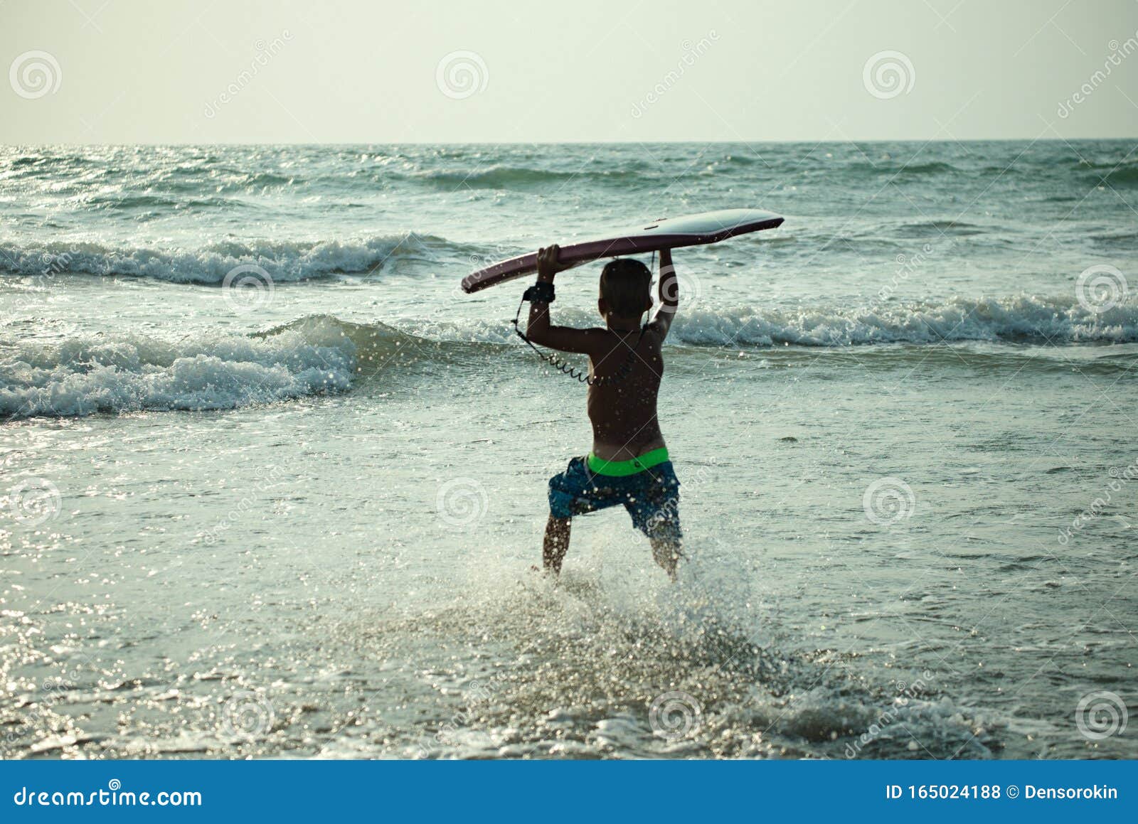 Boy with bodyboard stock photo. Image of surf, swimwear - 165024188