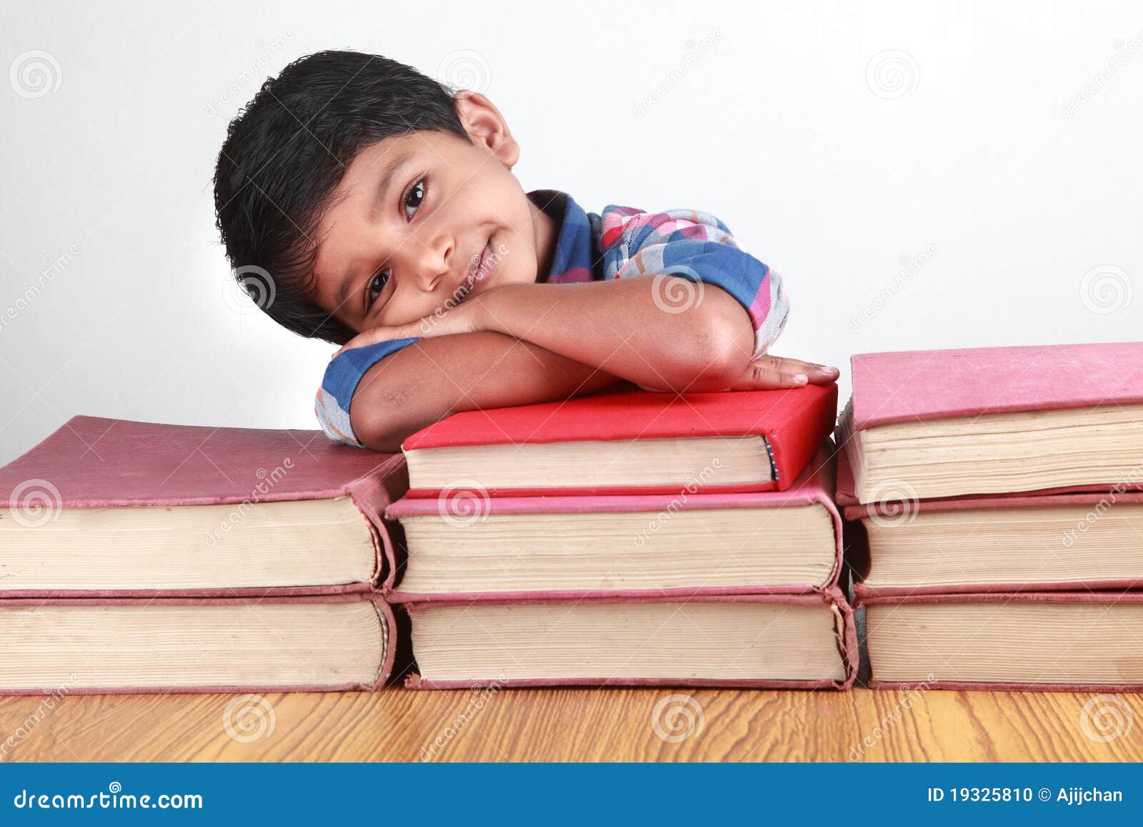 Boy and books stock photo. Image of learner, learning - 19325810