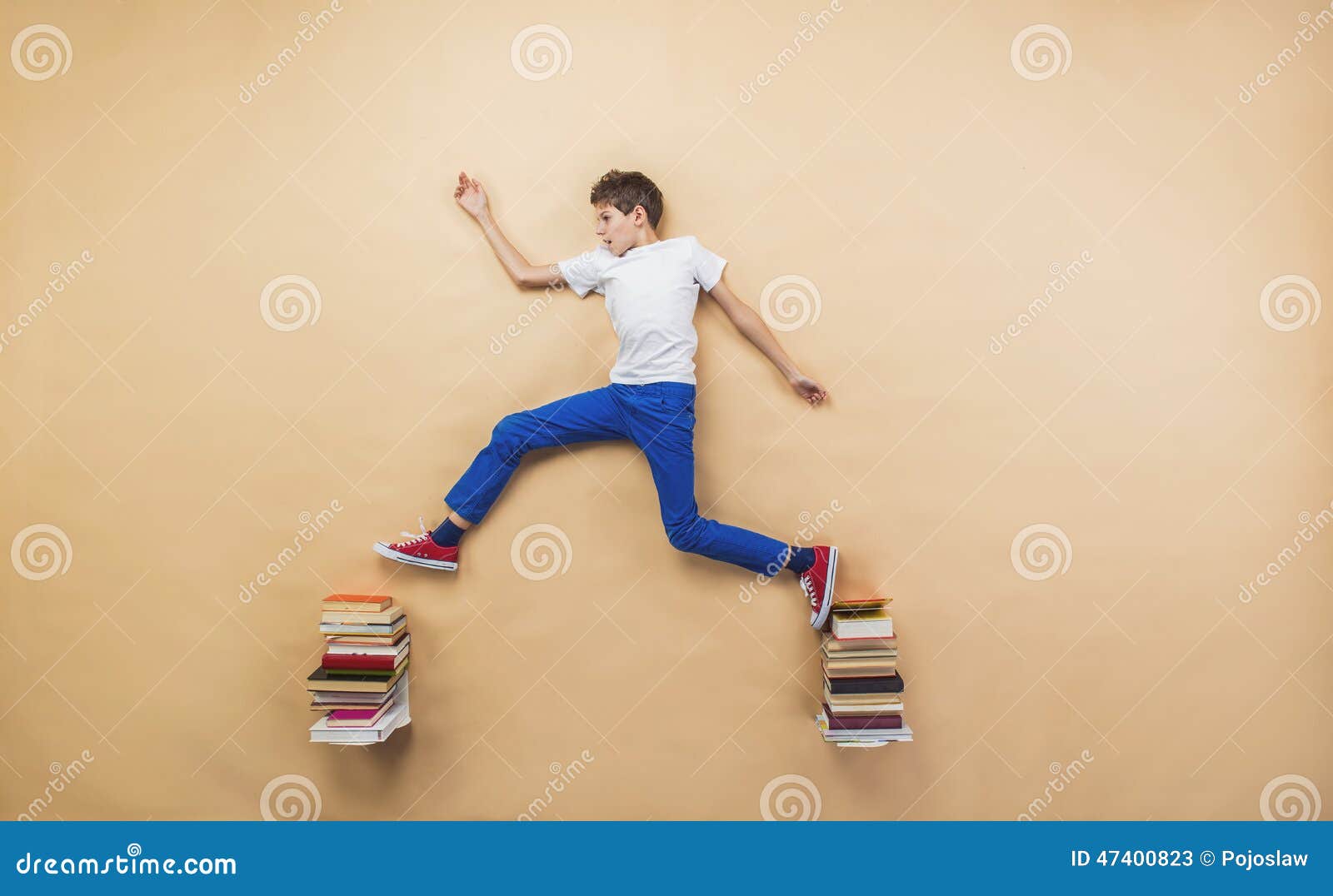 Boy with books stock image. Image of concept, books, pile - 47400823