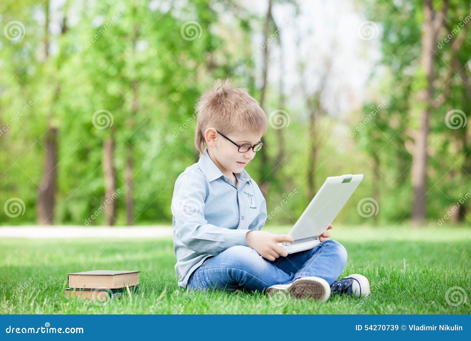 Boy with a Books and Laptop Computer Stock Image - Image of beautiful ...