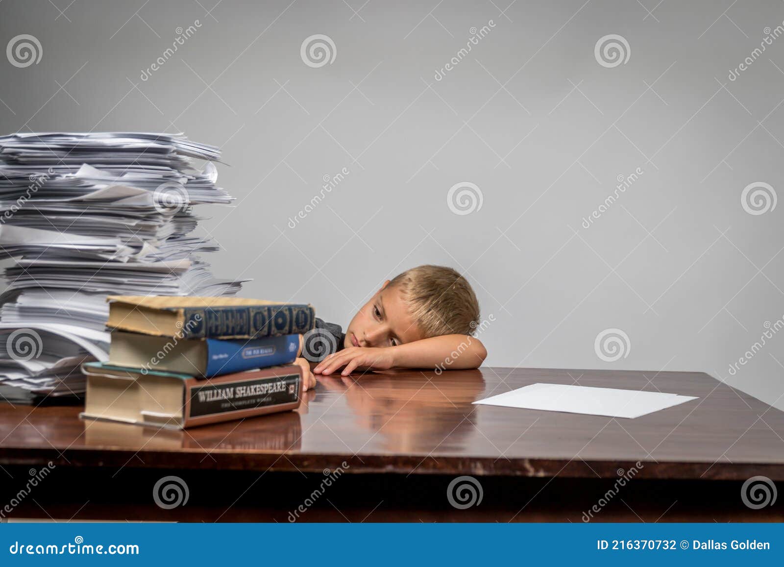 Boy Bored of Doing His Tall Stack of Homework Stock Photo - Image of ...