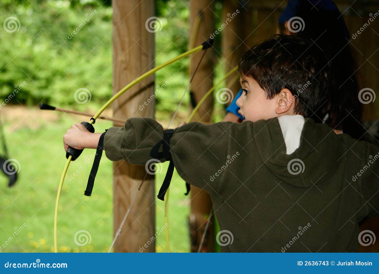 Boy with bow and arrow stock image. Image of coordination - 2636743