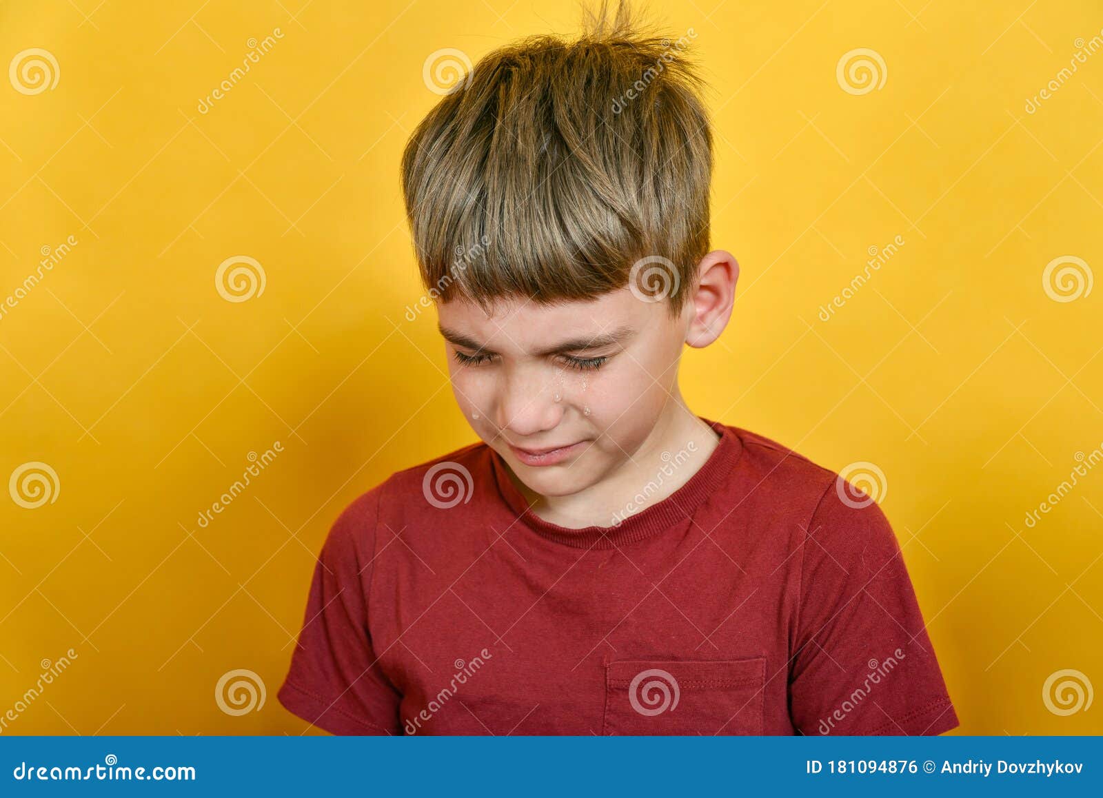 The Boy Bowed His Head and Cries Softly Stock Photo - Image of ...