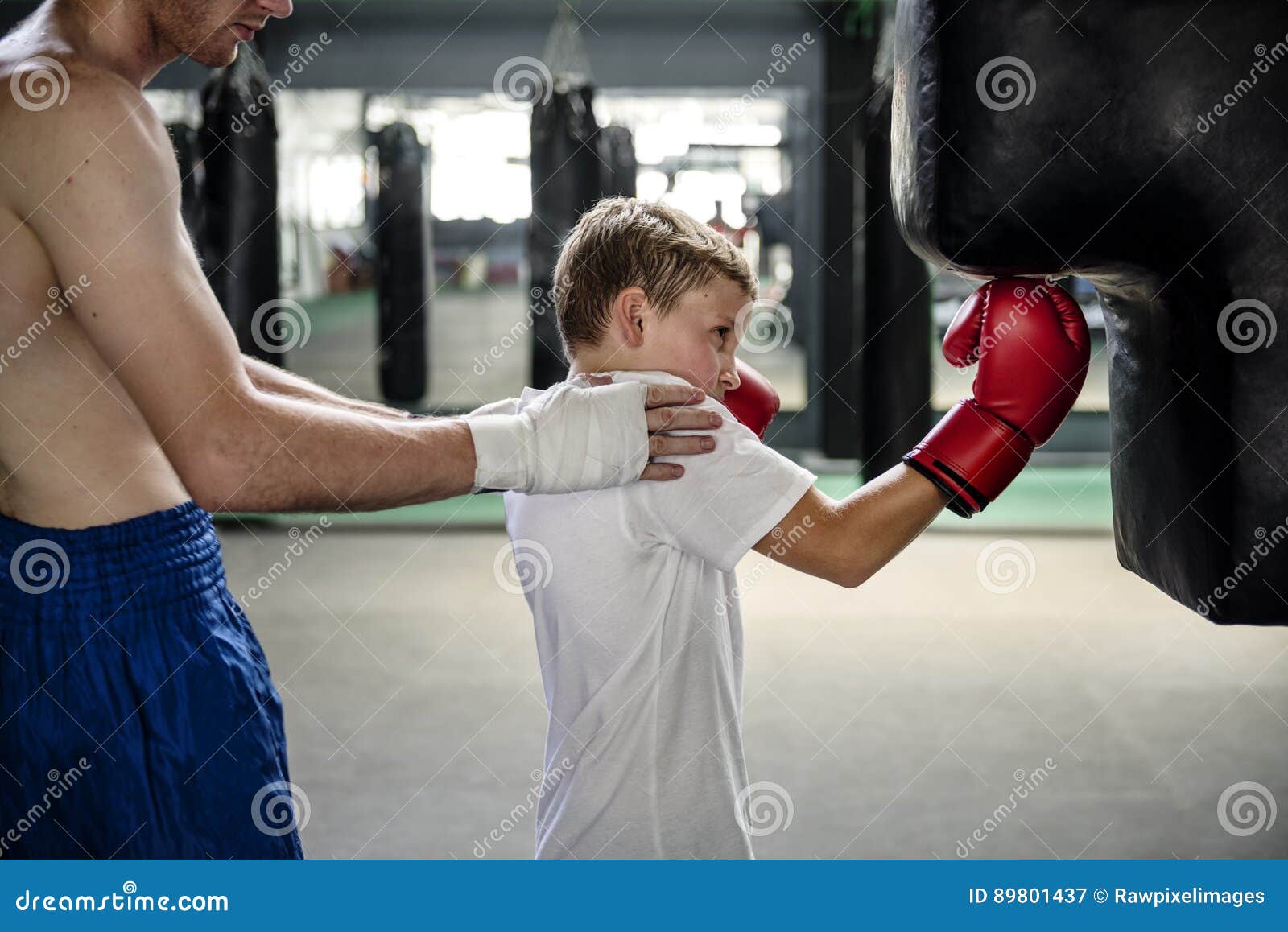 Boy Boxing Training Punching Bag Exercise Concept Stock Image - Image ...