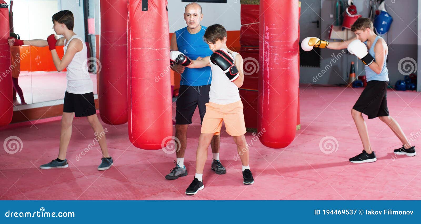 Boy at Boxing Workout with Instructor Stock Image - Image of boxing ...