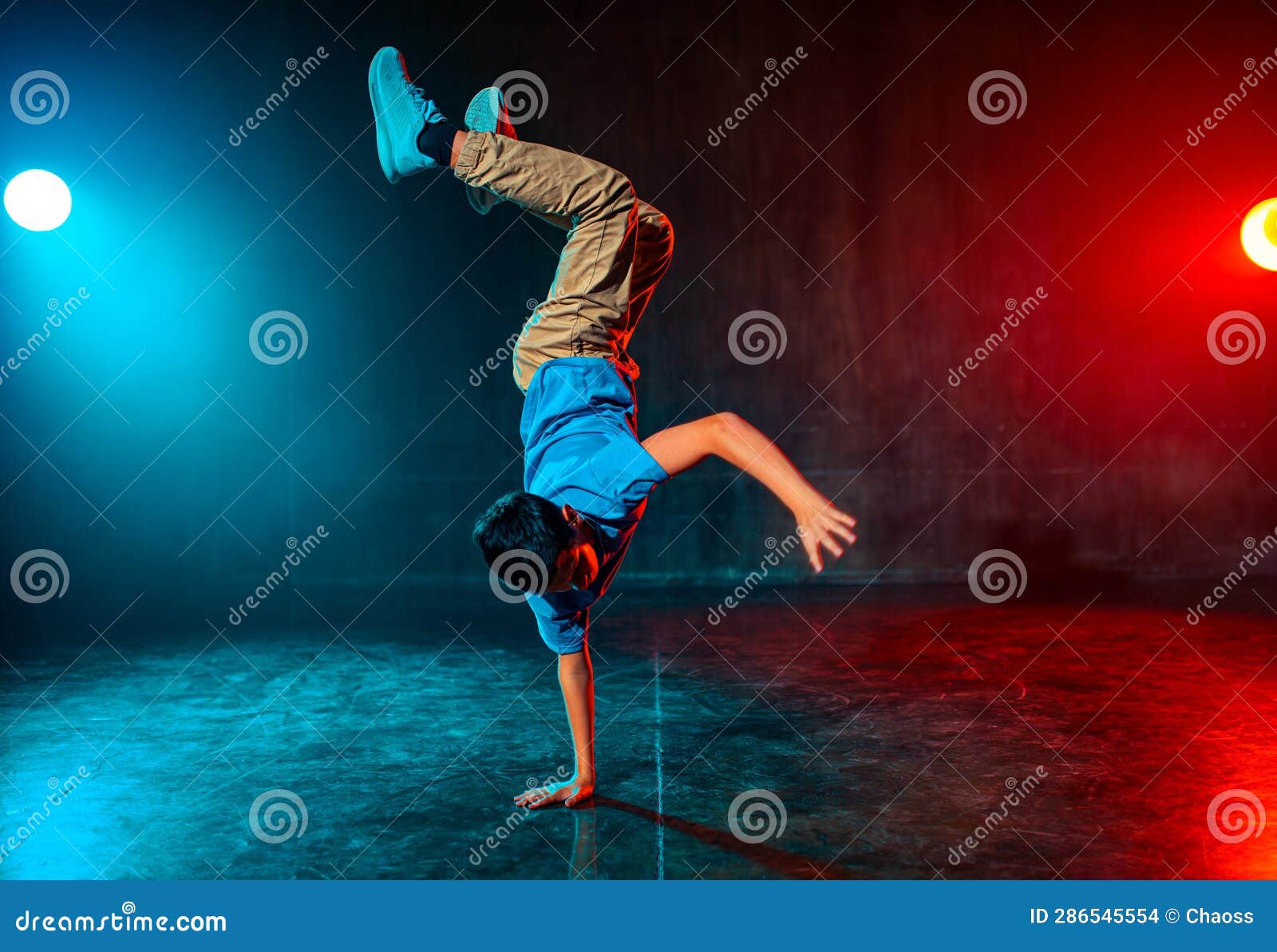 Boy breakdancing in studio stock photo. Image of dancing - 286545554
