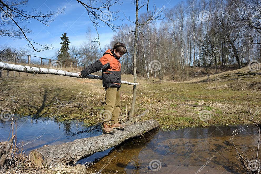 Boy on the bridge stock image. Image of warm, outdor - 12525139