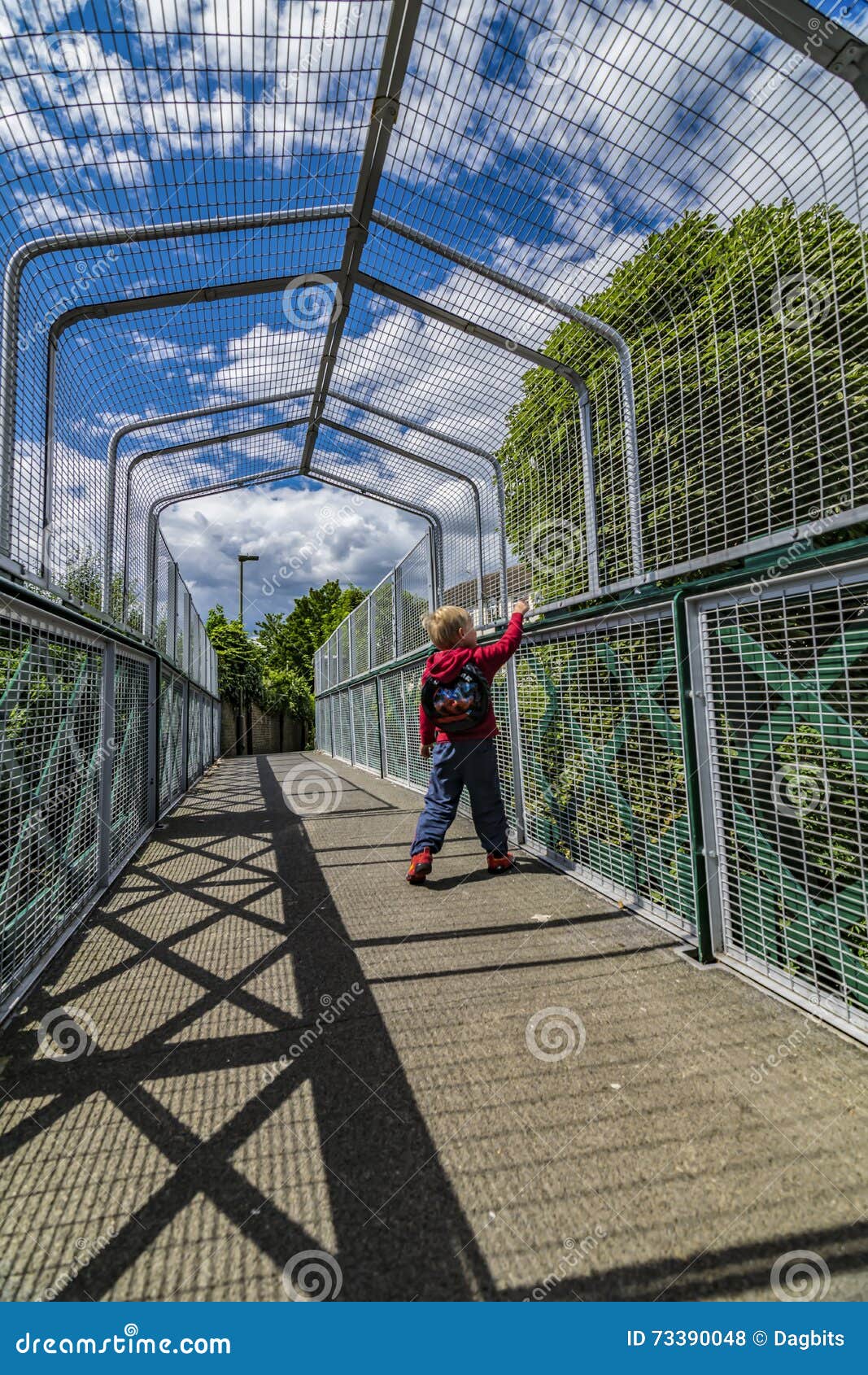 Boy on the Bridge Over Railway Line Stock Photo - Image of cage, line ...