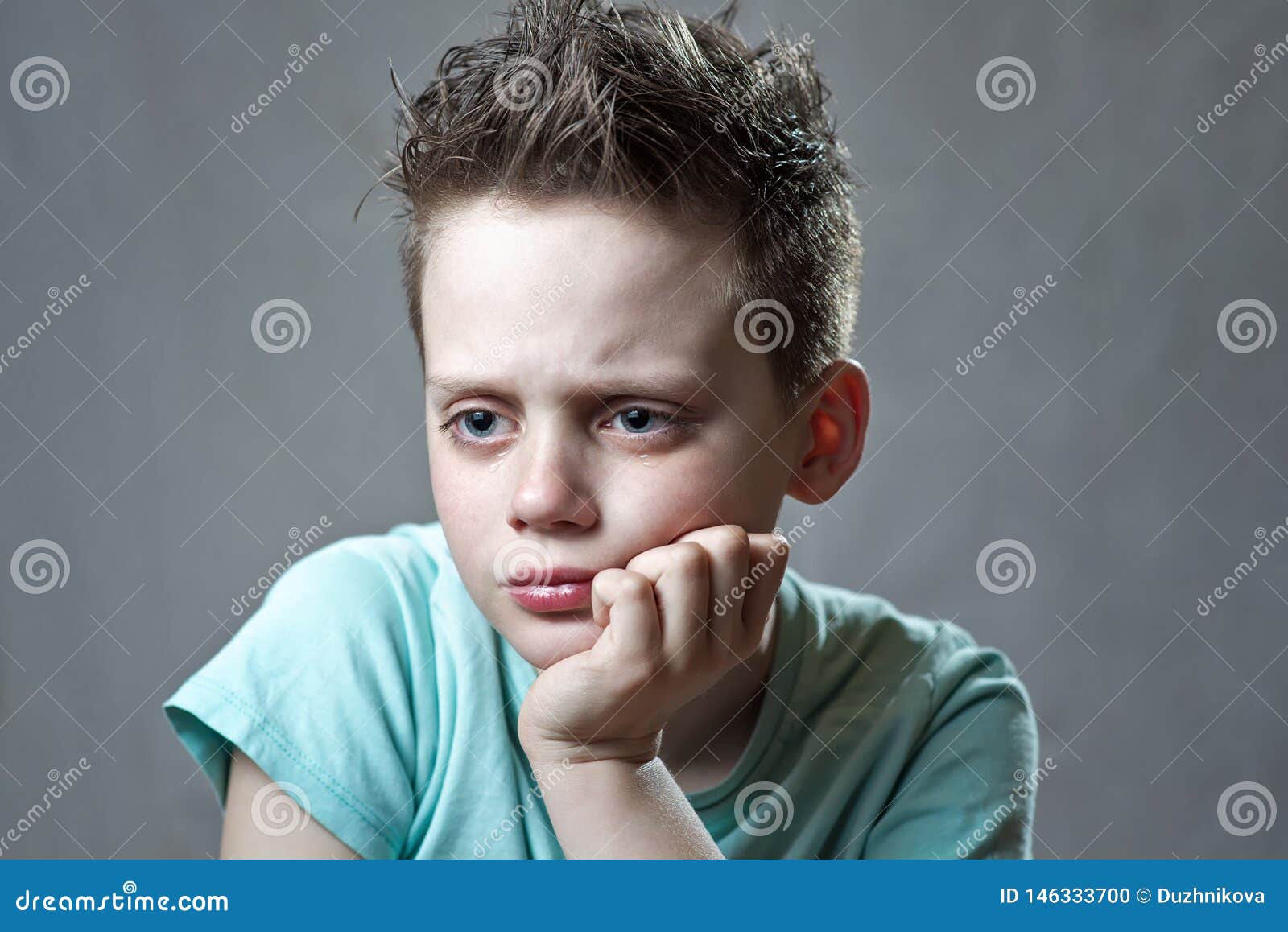 A Boy in a Bright T-shirt Offended and Crying Stock Photo - Image of ...