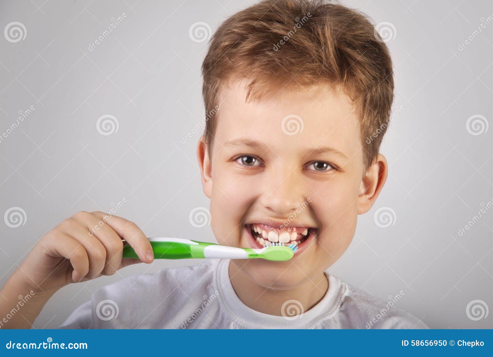 Boy brushing teeth stock photo. Image of beauty, bathroom - 58656950