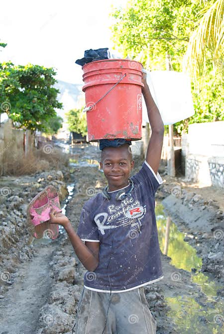 Boy with Bucket editorial stock image. Image of satellite - 7516099