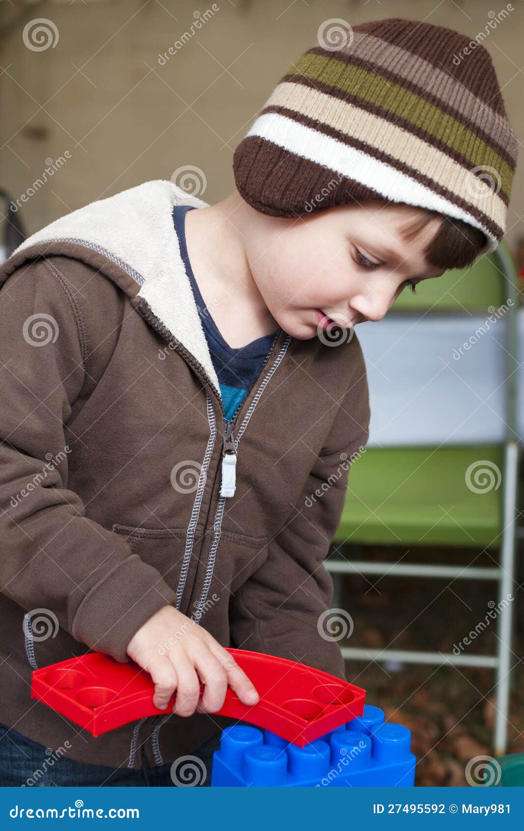 Boy Building with Big Blocks Stock Photo - Image of autumn, growing ...