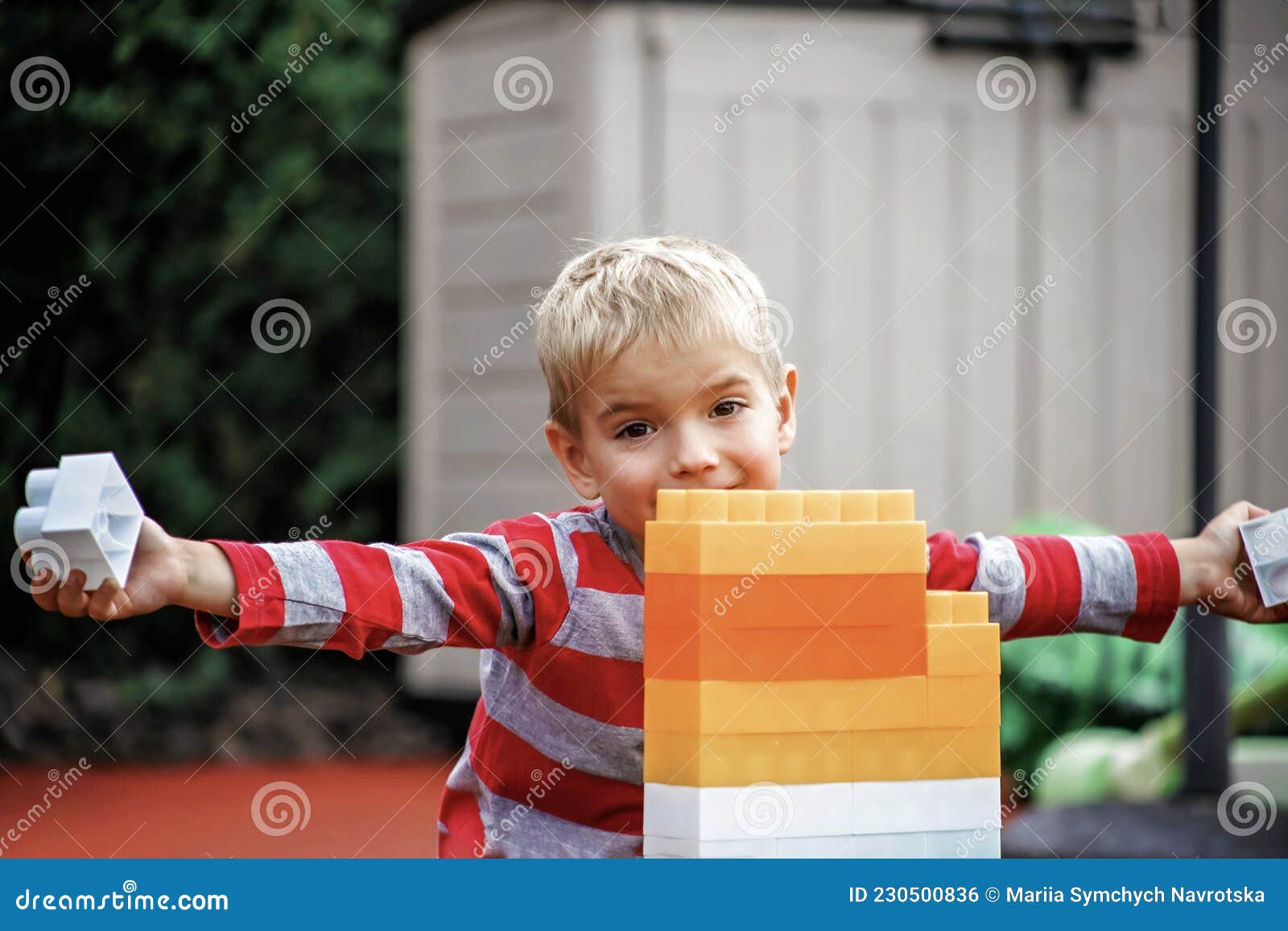 Boy Building Constructor Tower from Plastic Blocks Stock Photo - Image ...