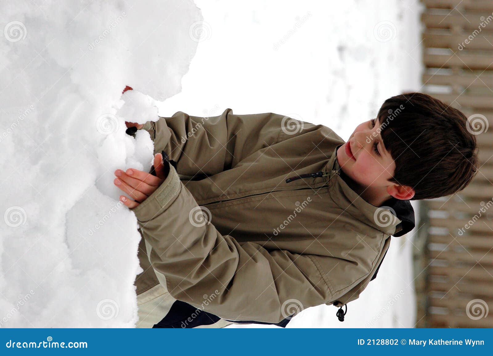 Boy Building Igloo Picture. Image: 2128802
