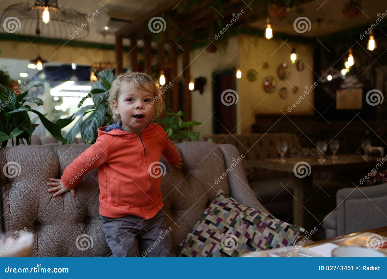 Boy in cafe stock image. Image of interior, dining, lifestyle - 82743451
