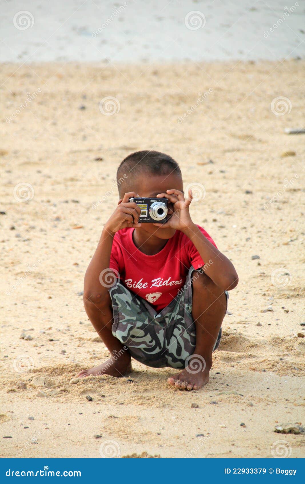 Boy with camera editorial stock image. Image of hobby - 22933379