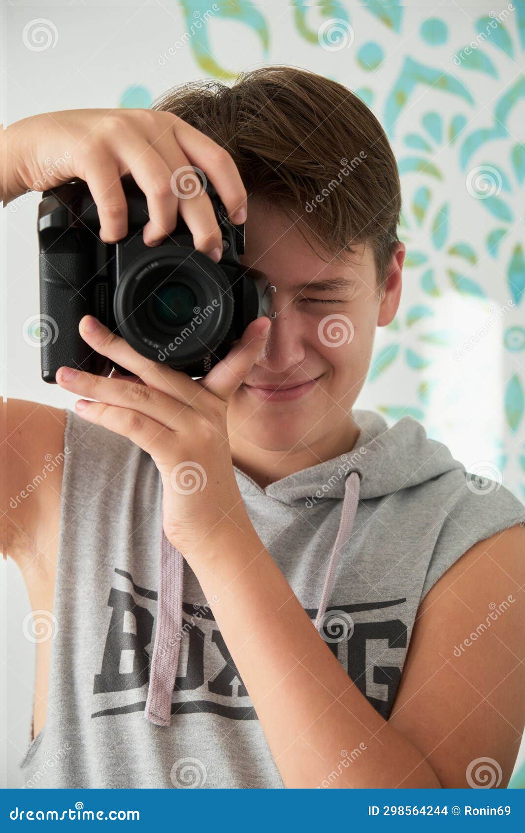 A Boy with Camera in His Hands Stock Photo - Image of camera, model ...
