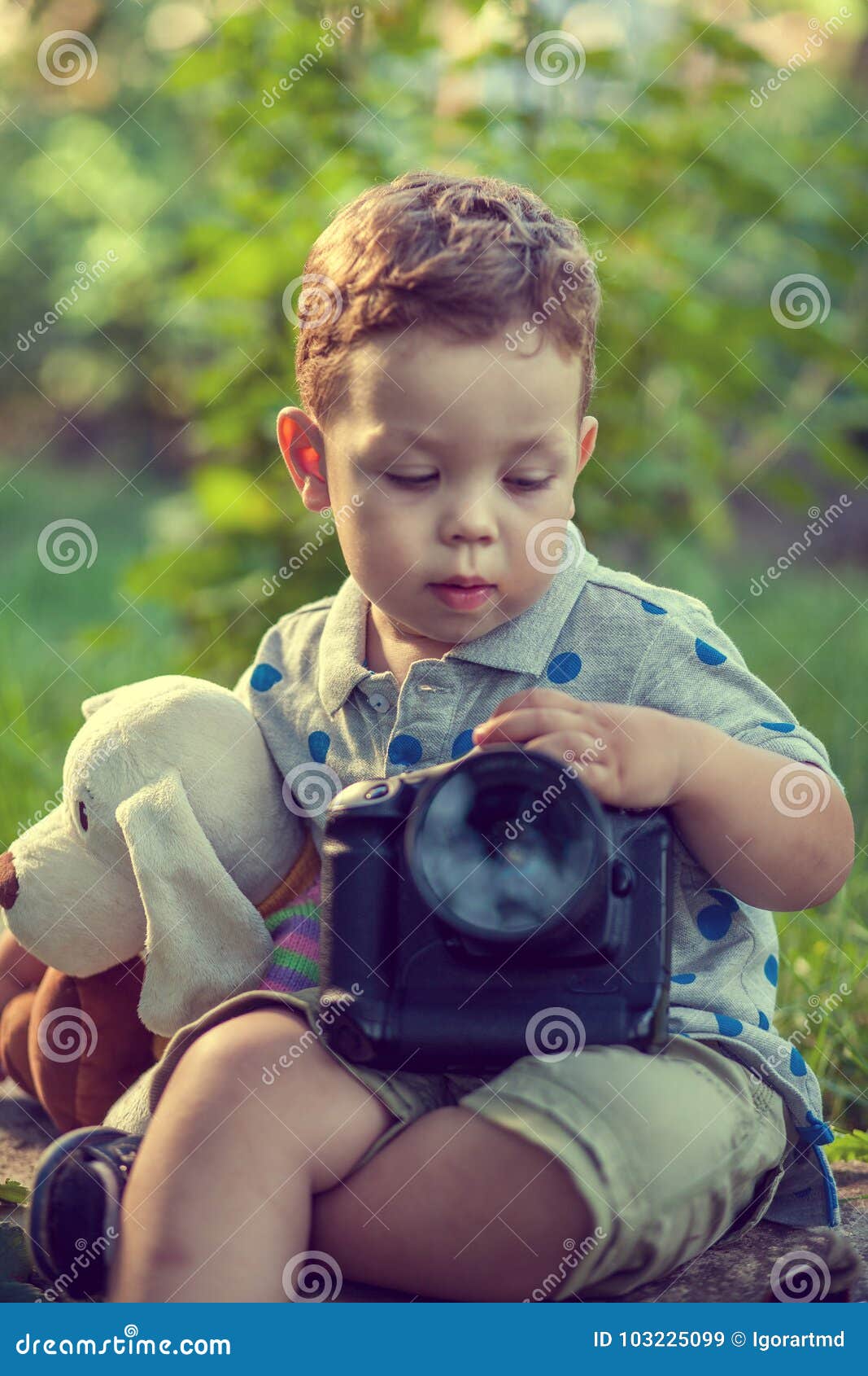 Boy with camera stock image. Image of childhood, happiness - 103225099