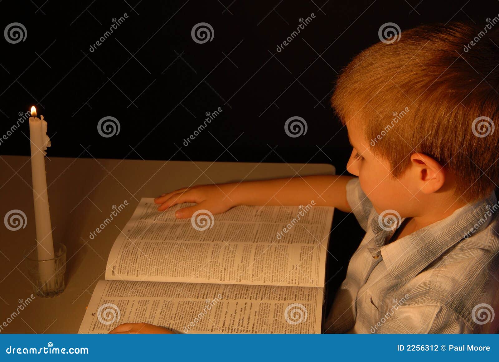 Boy by Candlelight stock photo. Image of child, students - 2256312