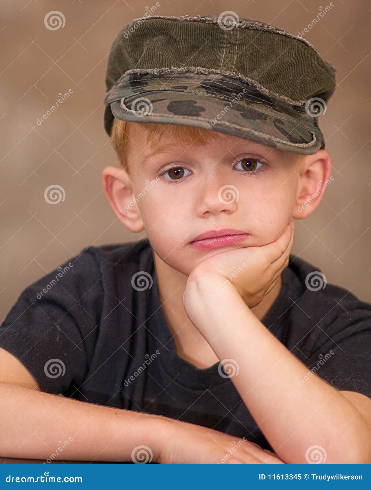 Boy in Cap stock image. Image of pose, wondering, young - 11613345
