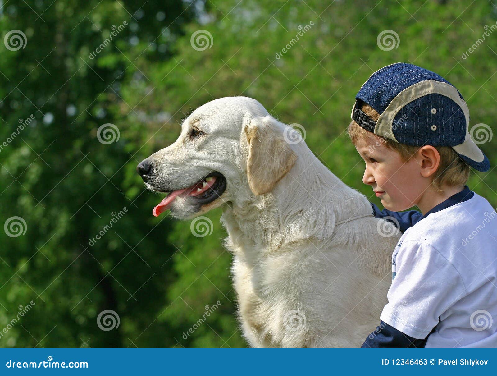 The boy in a cap stock image. Image of cute, pets, childhood - 12346463