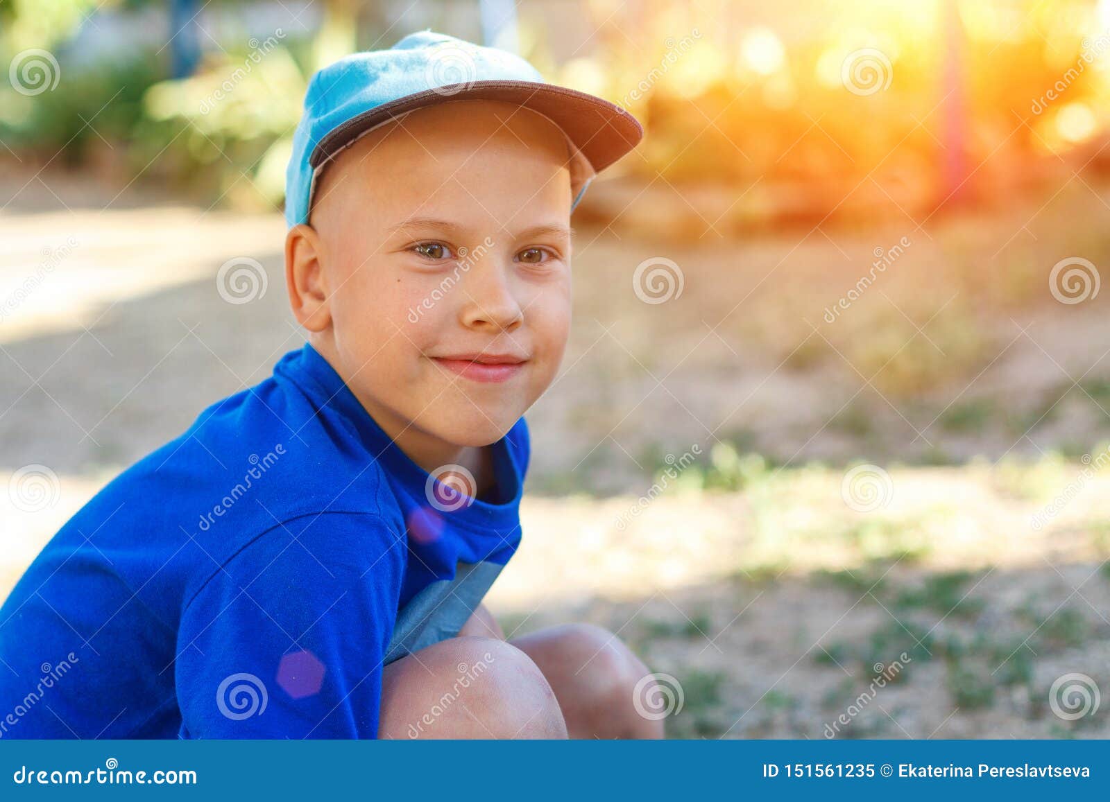 A Boy in a Cap on the Nature Smiles. Happy Child Stock Image - Image of ...