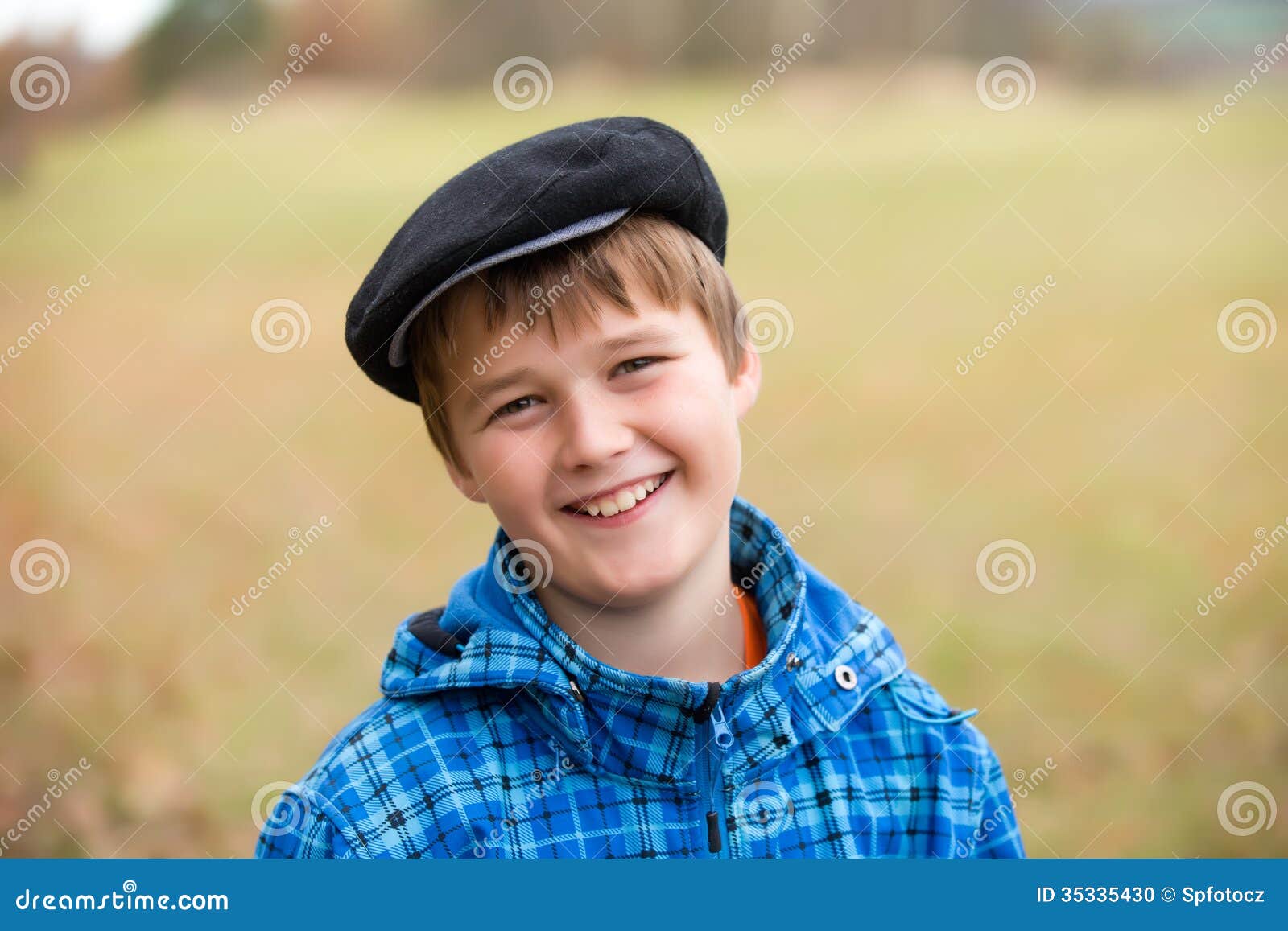 Boy in cap smiling stock photo. Image of cute, close - 35335430