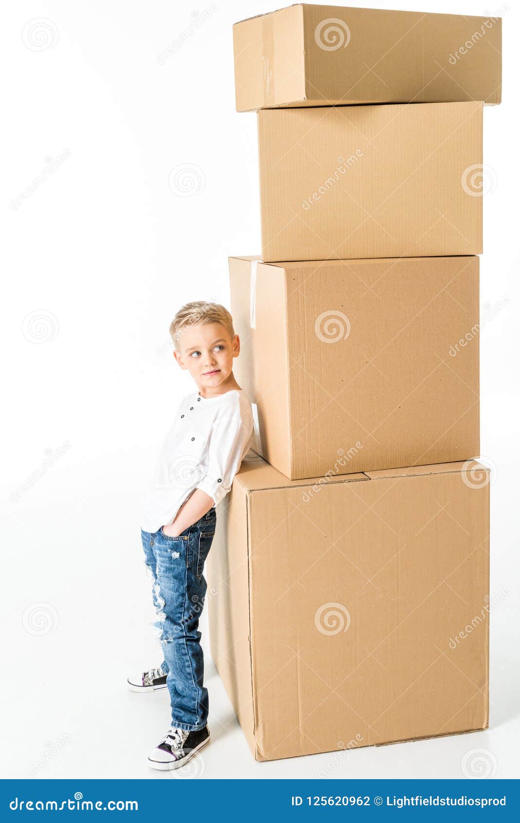 Boy with cardboard boxes stock photo. Image of packing - 125620962