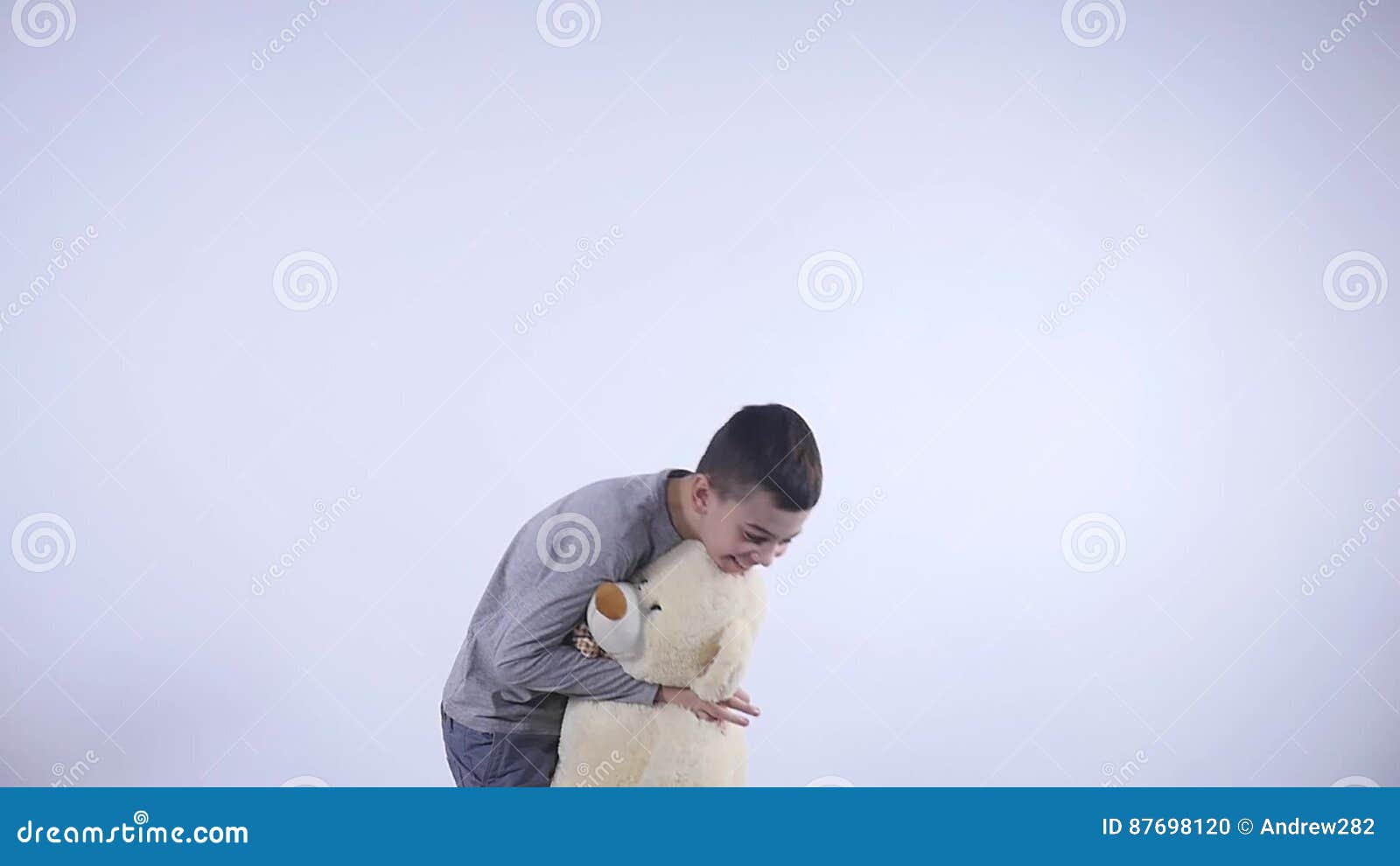 Boy Catches a Teddy Bear Isolated on White Background Stock Footage ...