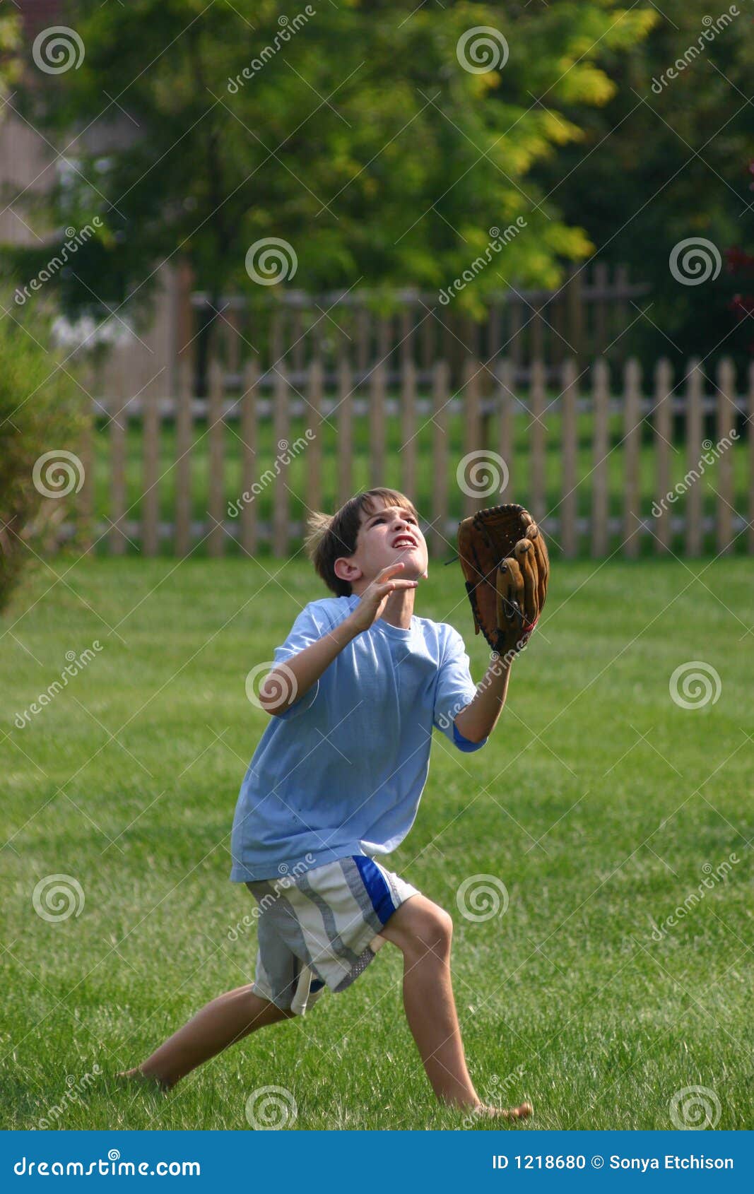Boy Catching Ball stock photo. Image of childhood, close - 1218680