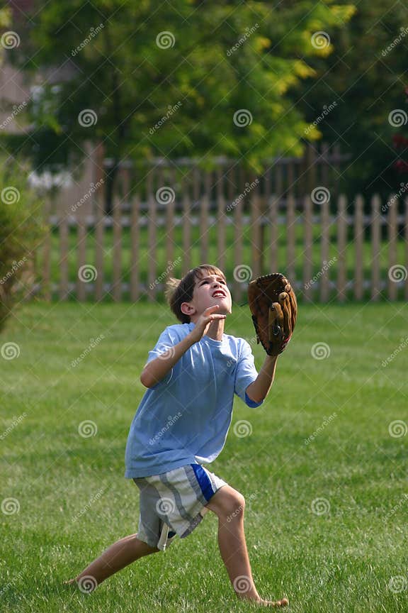 Boy Catching Ball stock photo. Image of childhood, close - 1218680