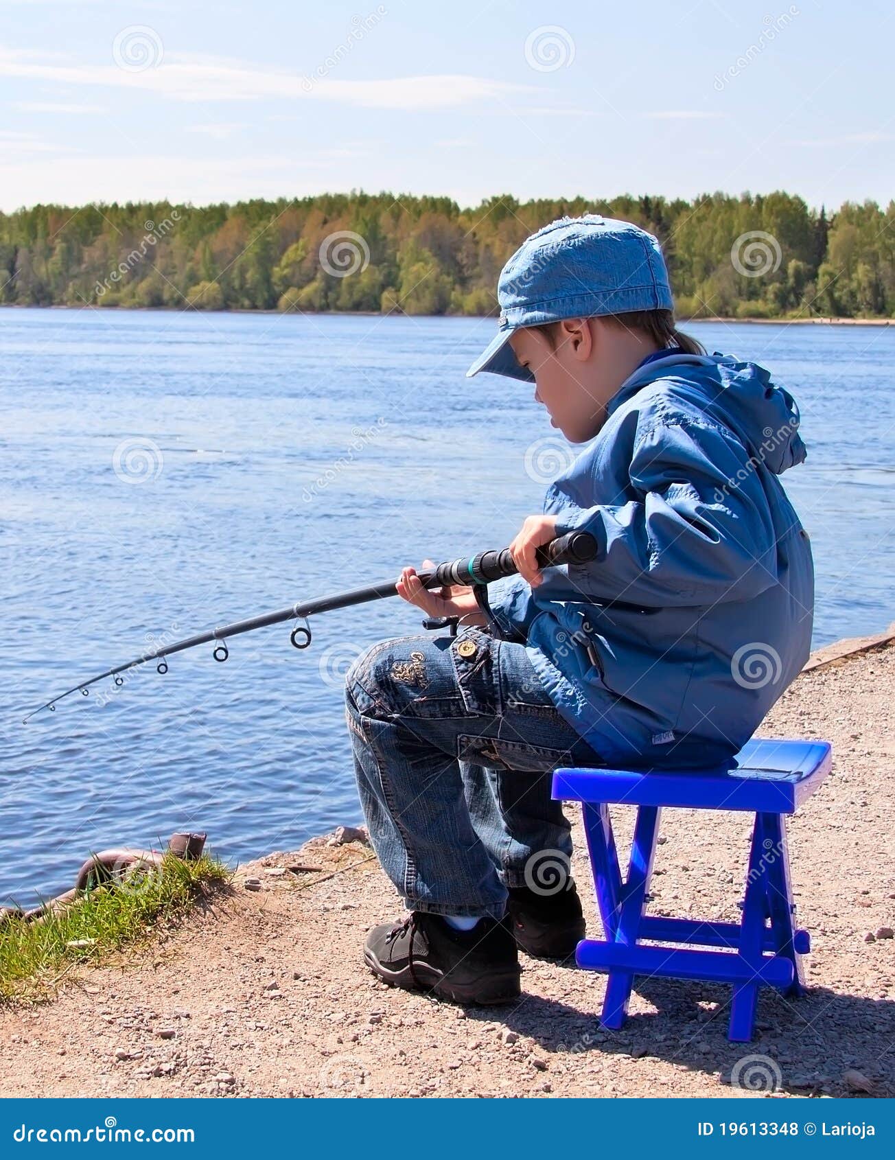 Boy Is Catching Fish Royalty Free Stock Photos - Image: 19613348