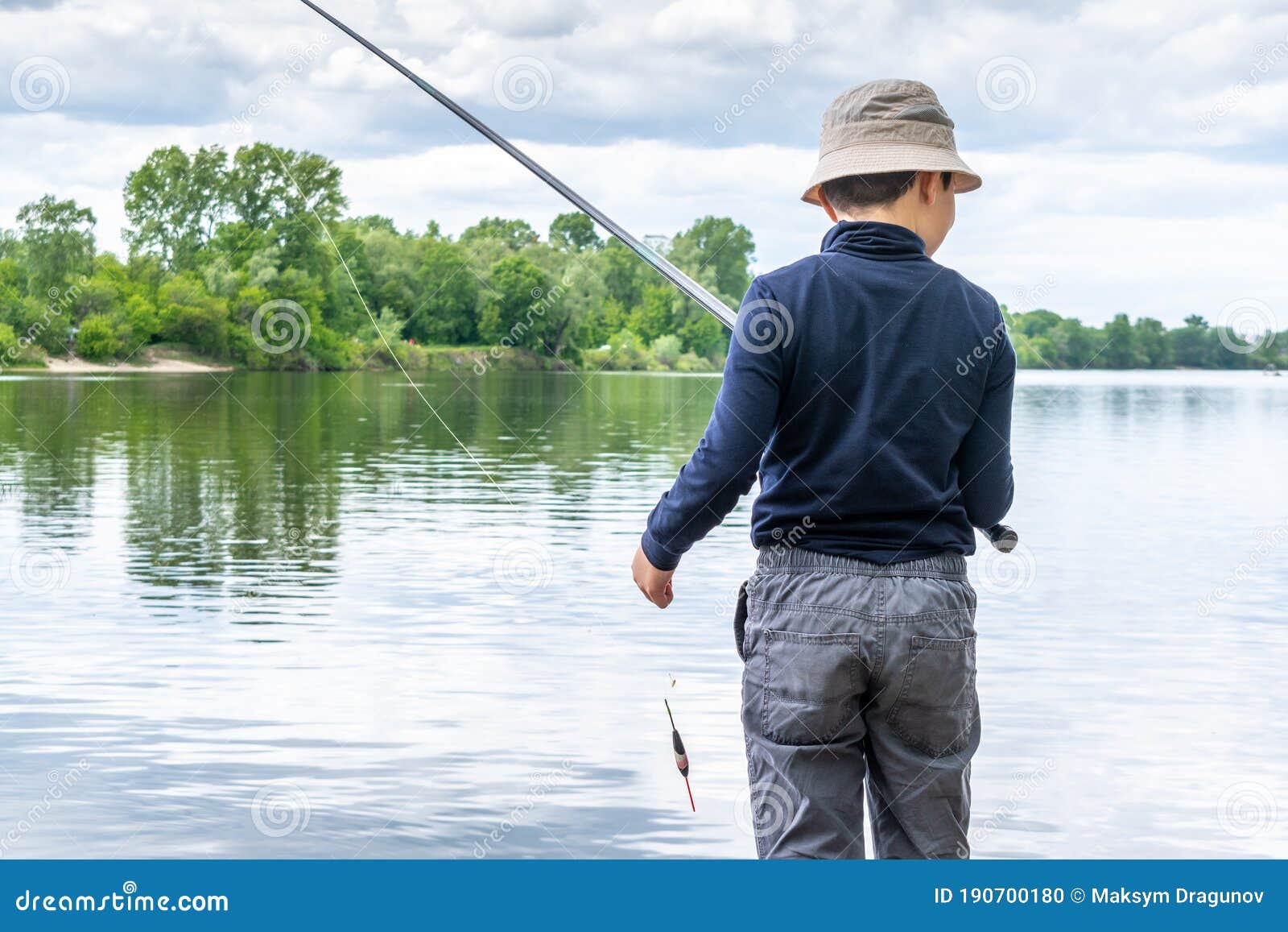 Boy catching fish stock photo. Image of lifestyle, relaxation - 190700180
