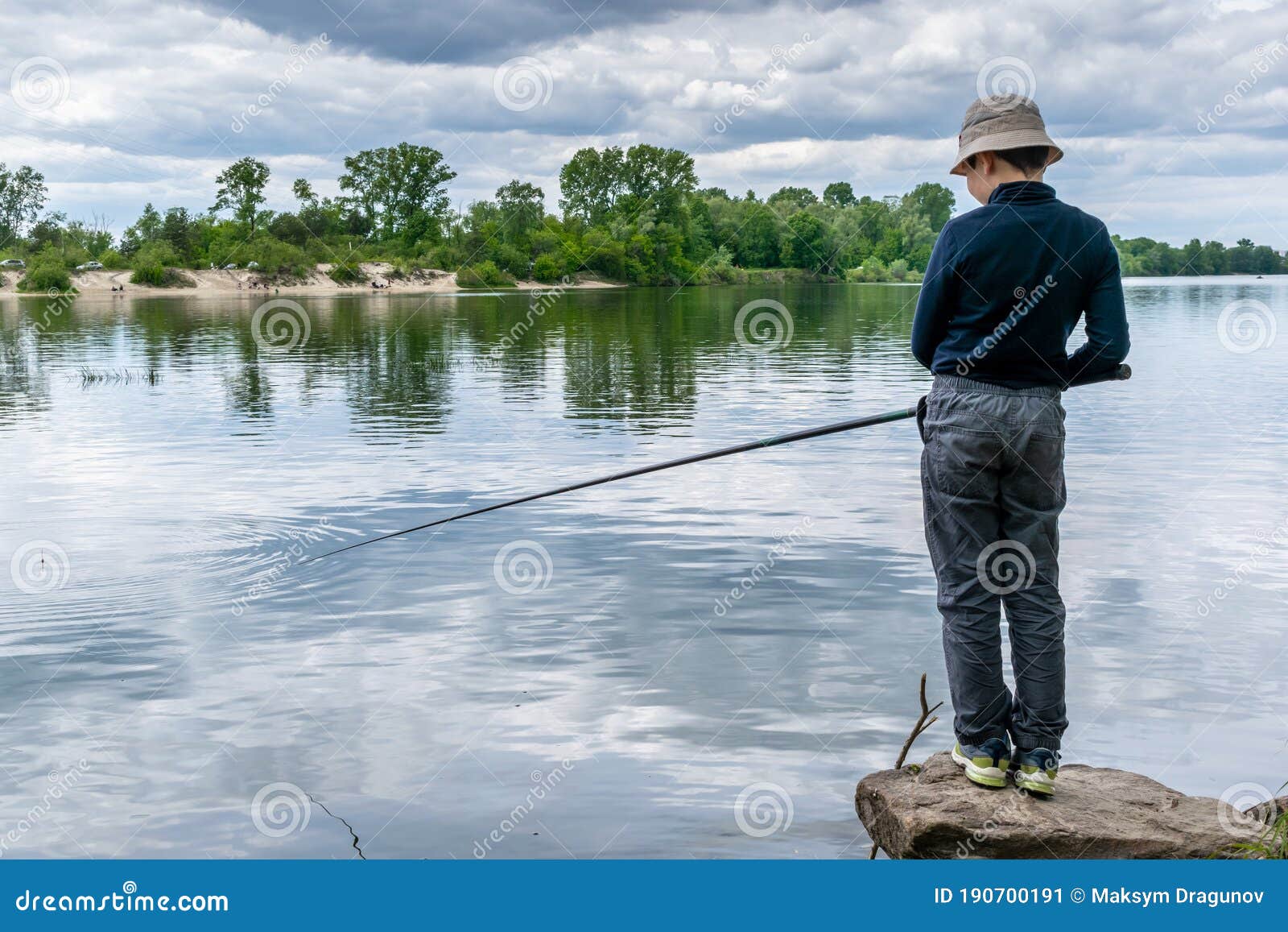 Boy catching fish stock image. Image of vacation, fishing - 190700191