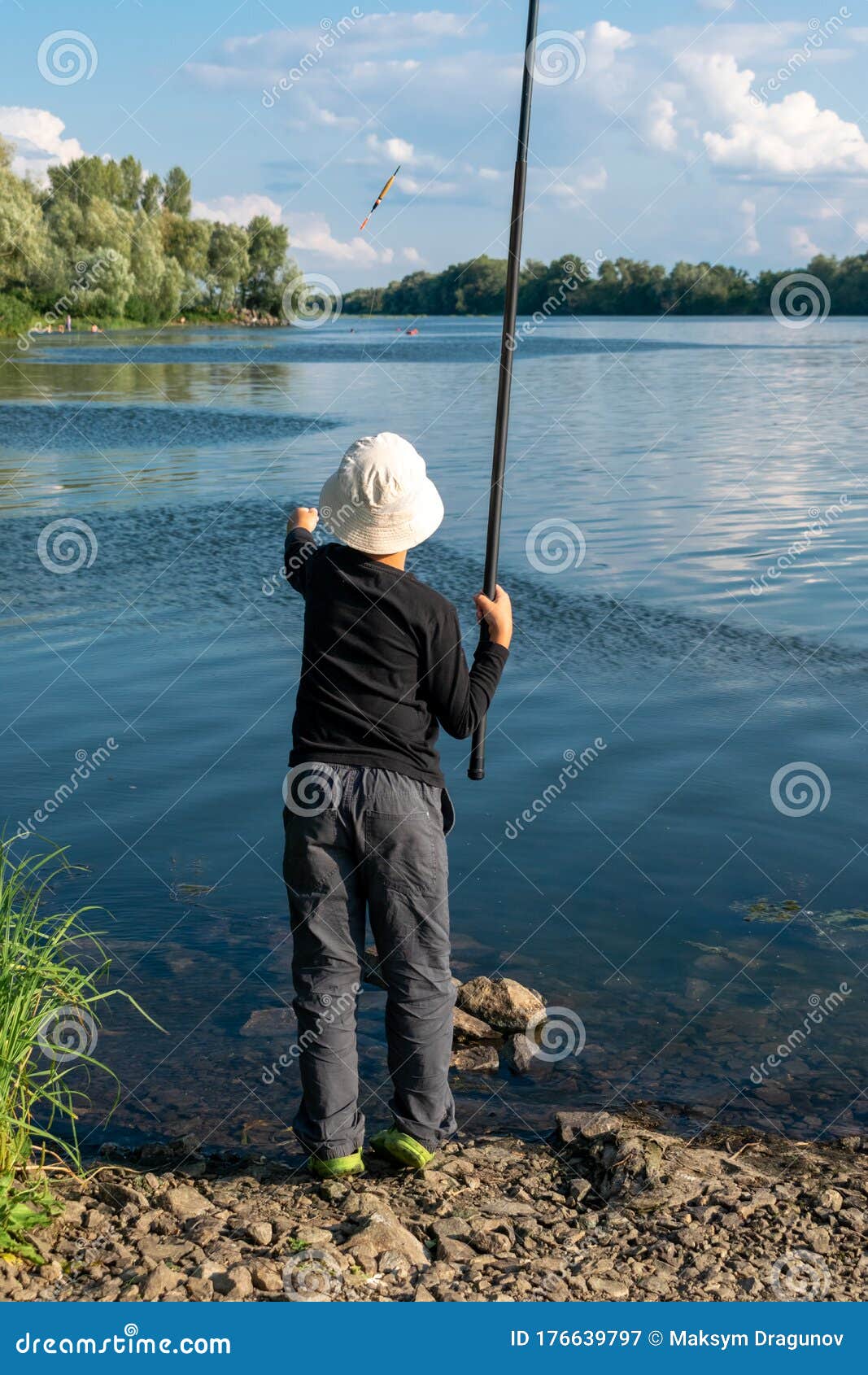 Boy catching fish stock image. Image of pond, nature - 176639797