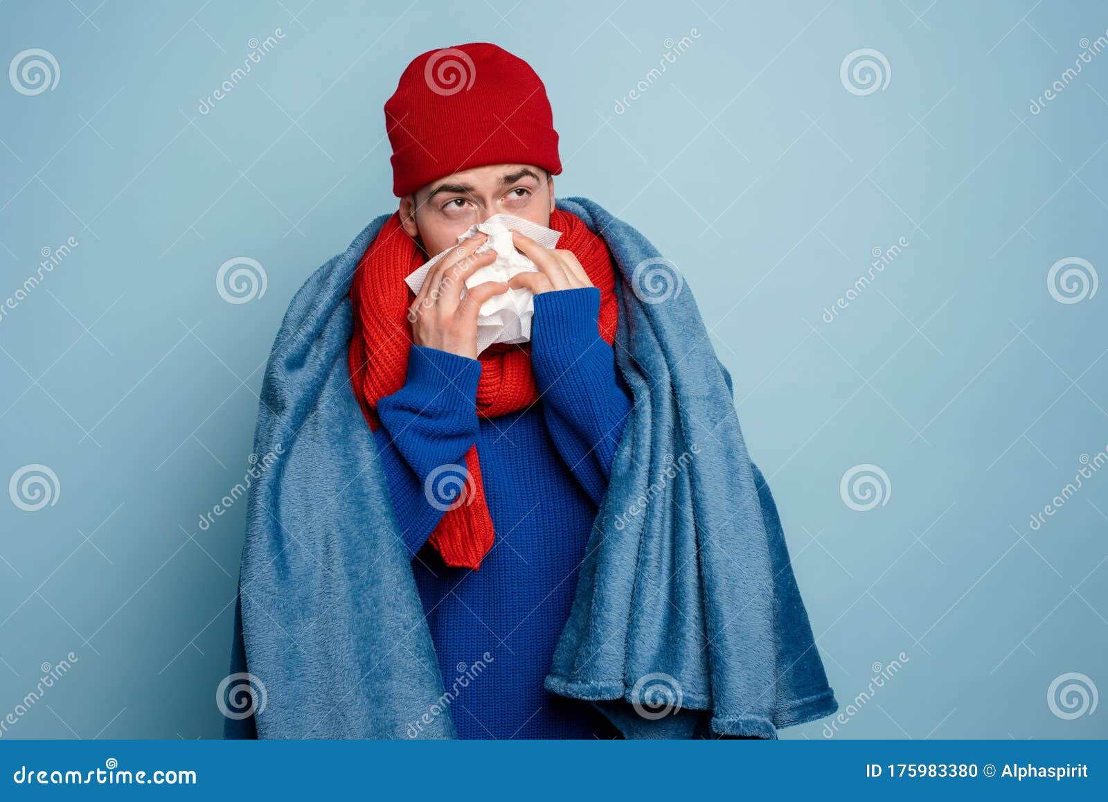 Boy Caught a Cold and Has Cold Chills. Studio on Cyan Background Stock ...