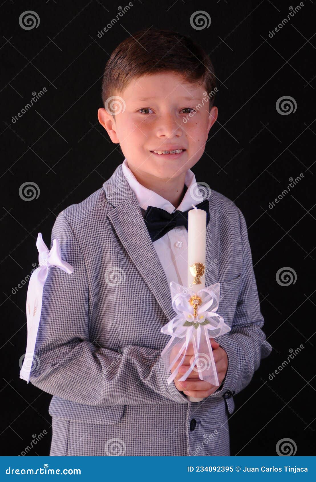 Boy Celebrating His First Holy Communion Stock Image - Image of eyes ...