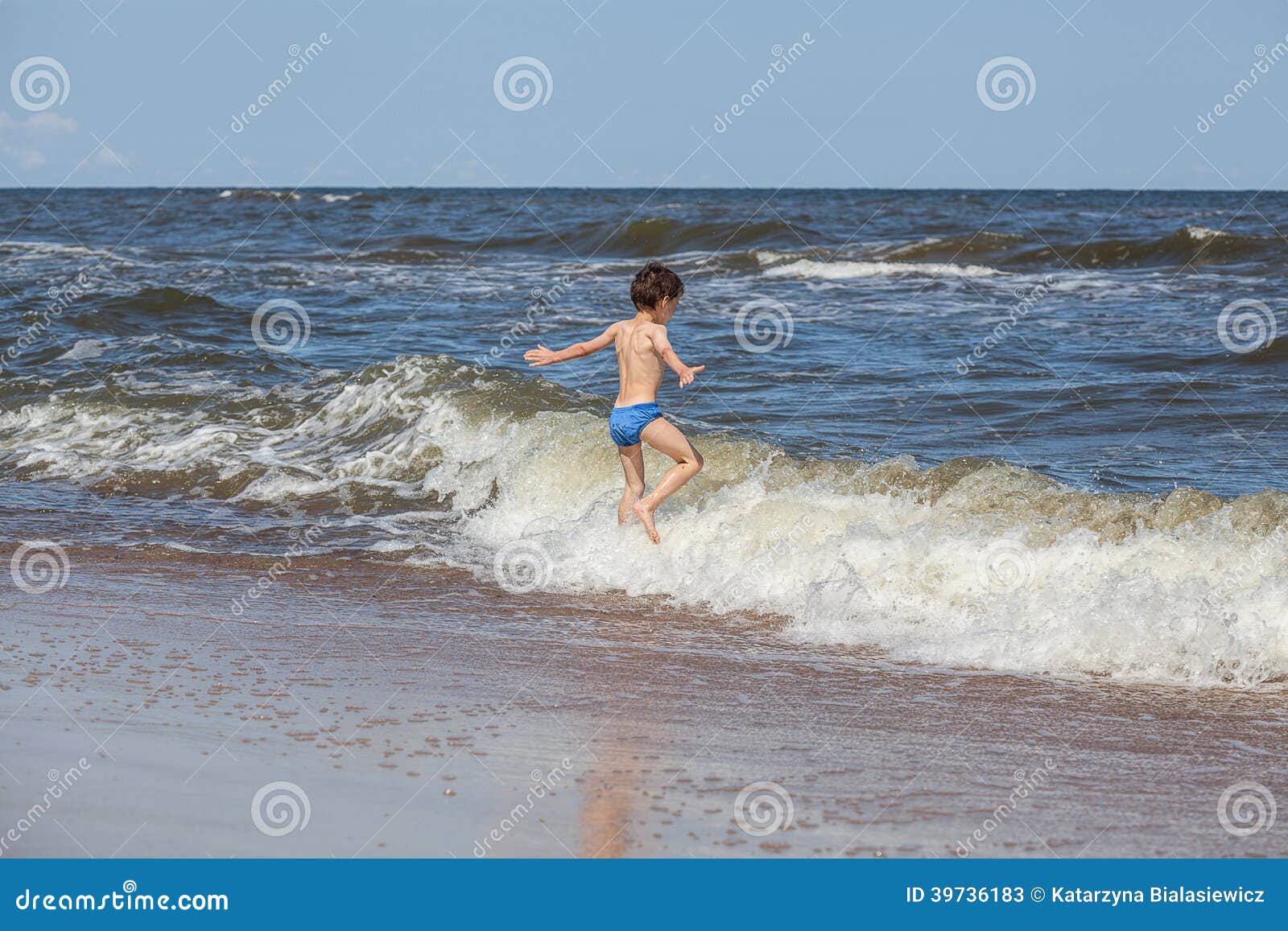 Boy chasing a waves stock image. Image of outside, ocean - 39736183