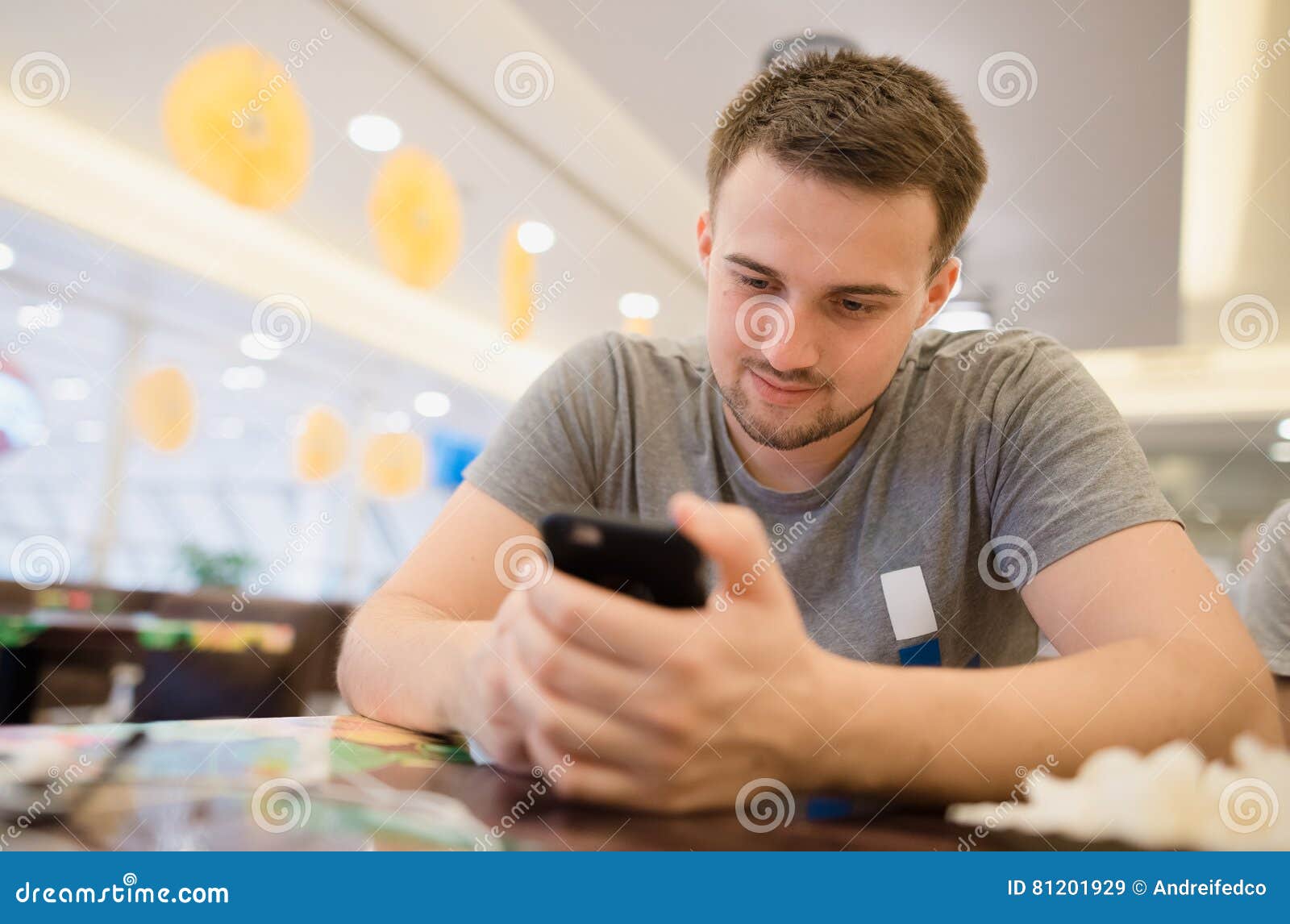 Boy checking his phone stock image. Image of smartphone - 81201929