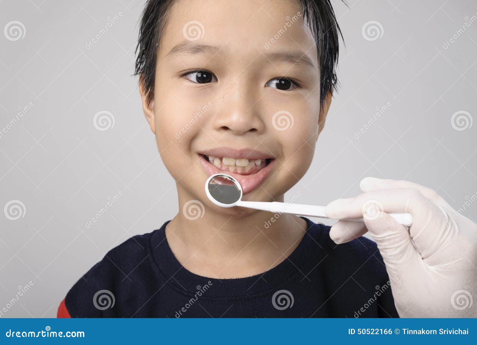 Boy Checking Tooth by Mirror Stock Photo - Image of tool, hygiene: 50522166