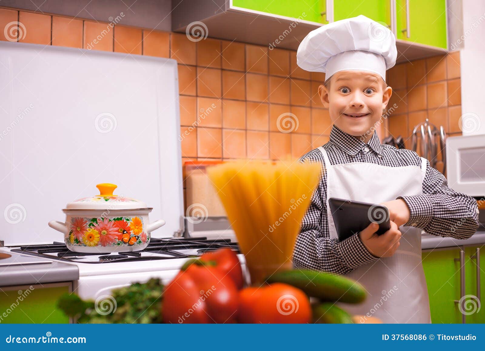 Boy Chef is Cooking on the Kitchen Stock Photo - Image of food ...