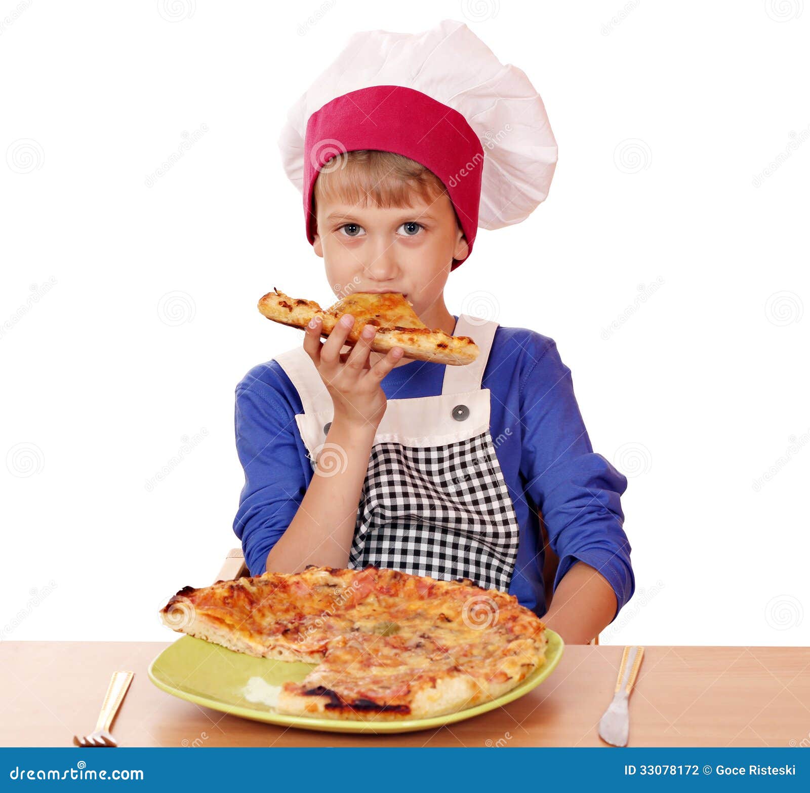 Boy chef eat pizza stock photo. Image of cook, crust - 33078172