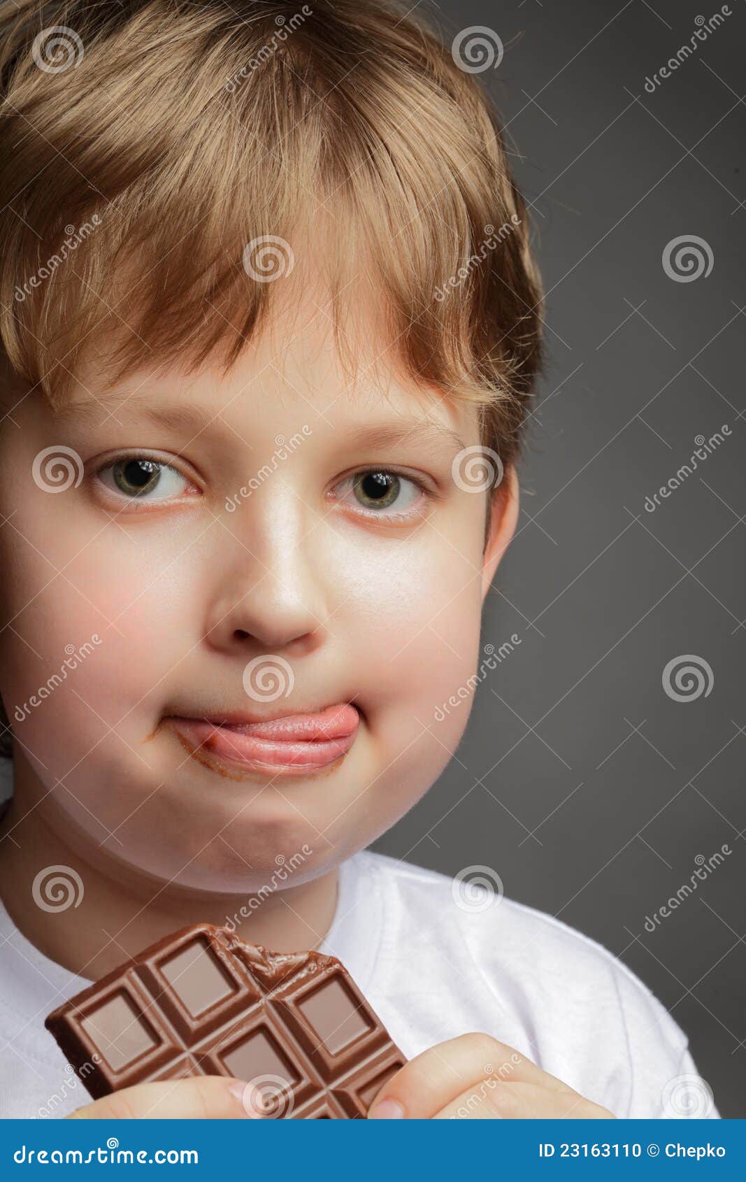 Boy with chocolate stock photo. Image of milk, slice - 23163110