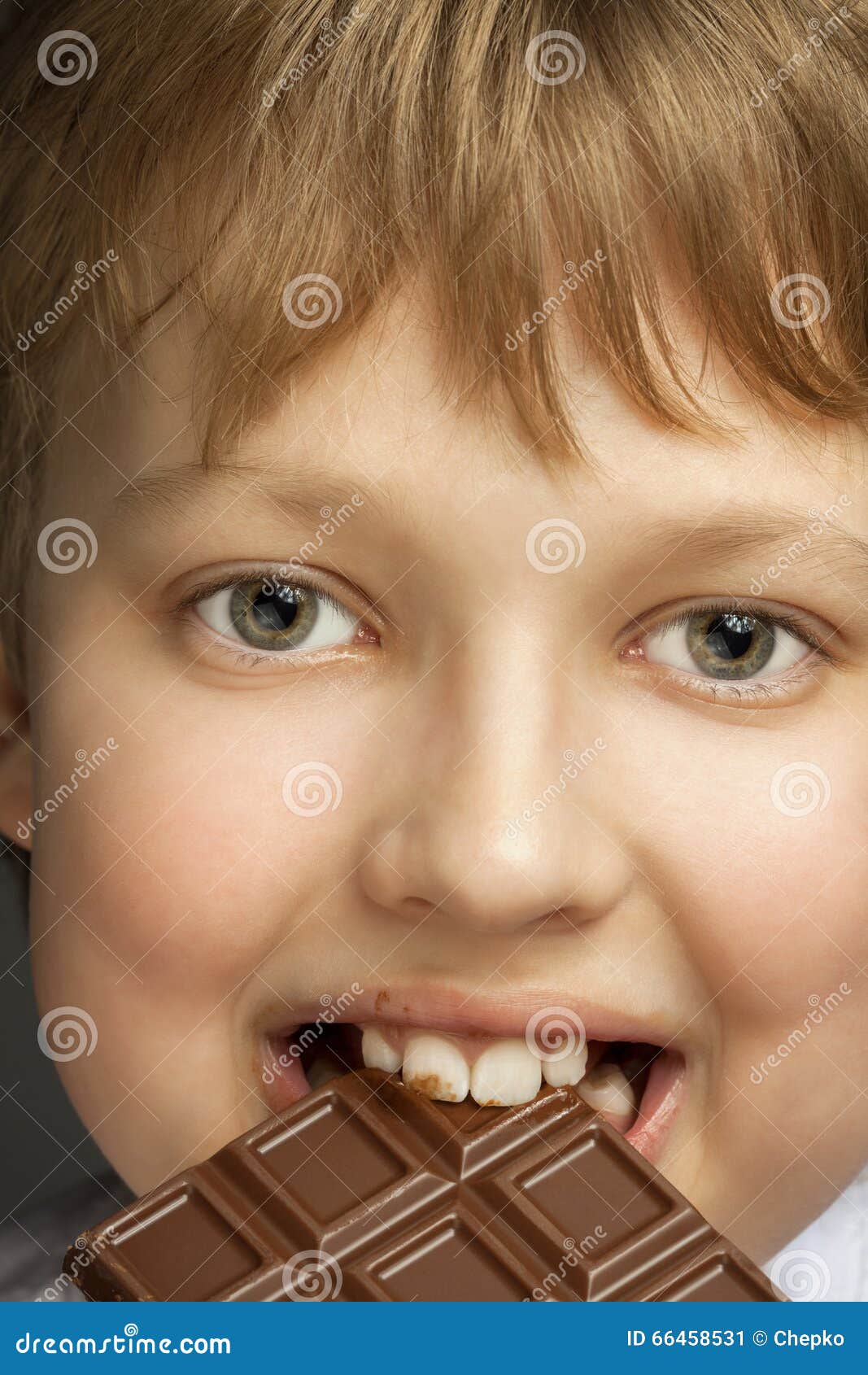 Boy with chocolate bar stock image. Image of chocolate - 66458531